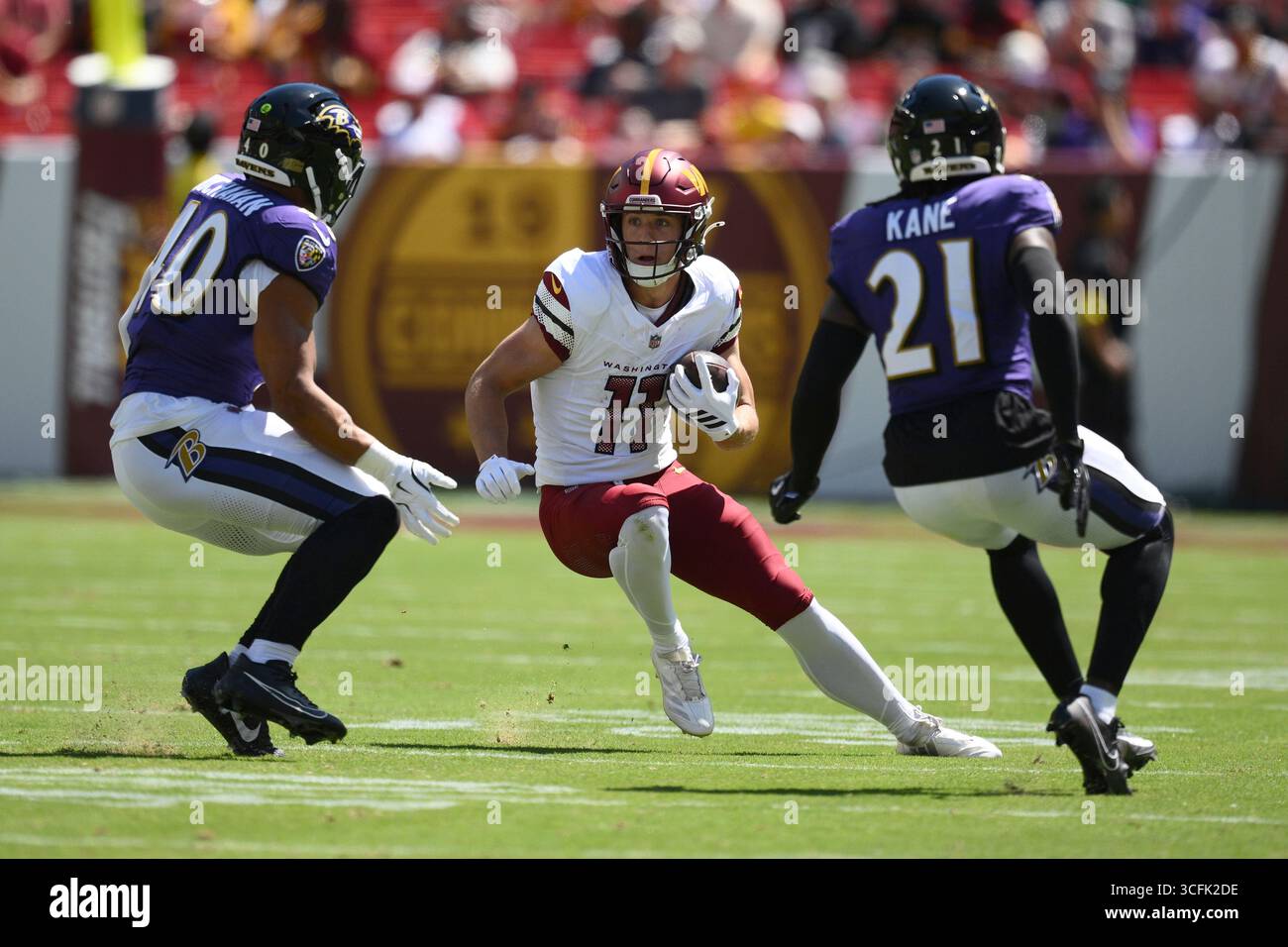 Washington Commanders wide receiver Luke McCaffrey (11) runs with the ...
