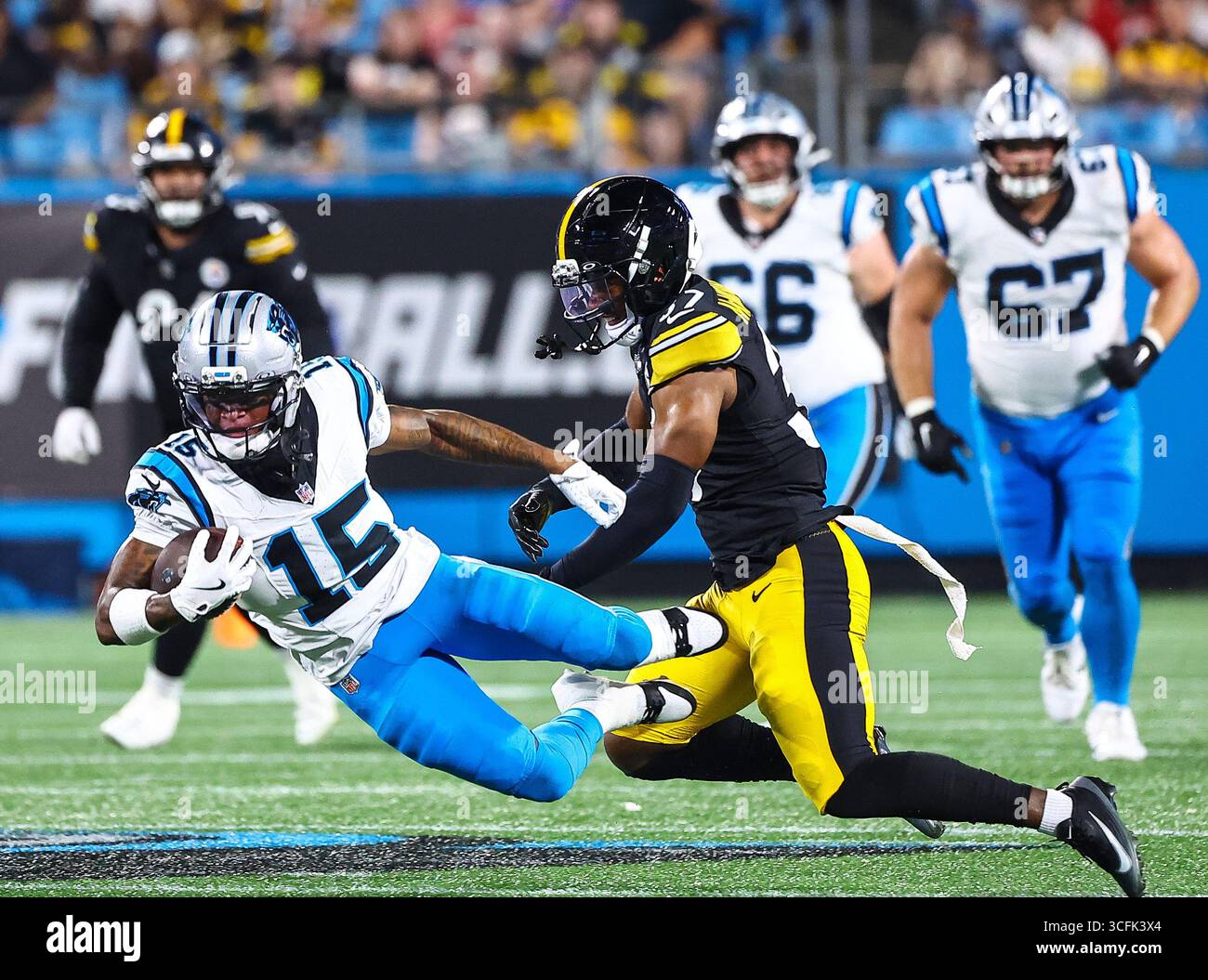 August 21, 2025: Panthers wide receiver Jimmy Horn Jr. (15) takes hit ...