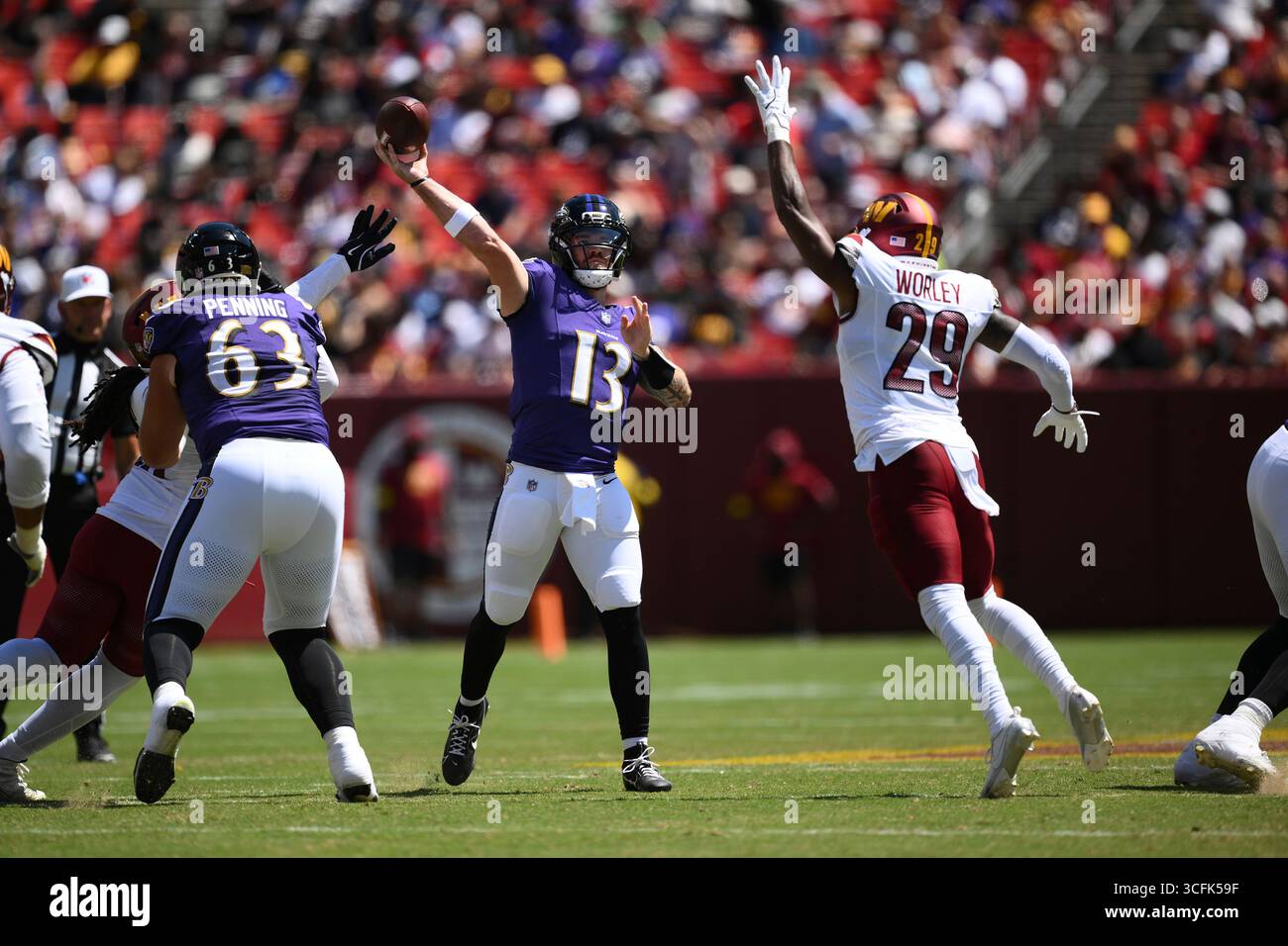 Baltimore Ravens quarterback Devin Leary (13) throws over Washington ...