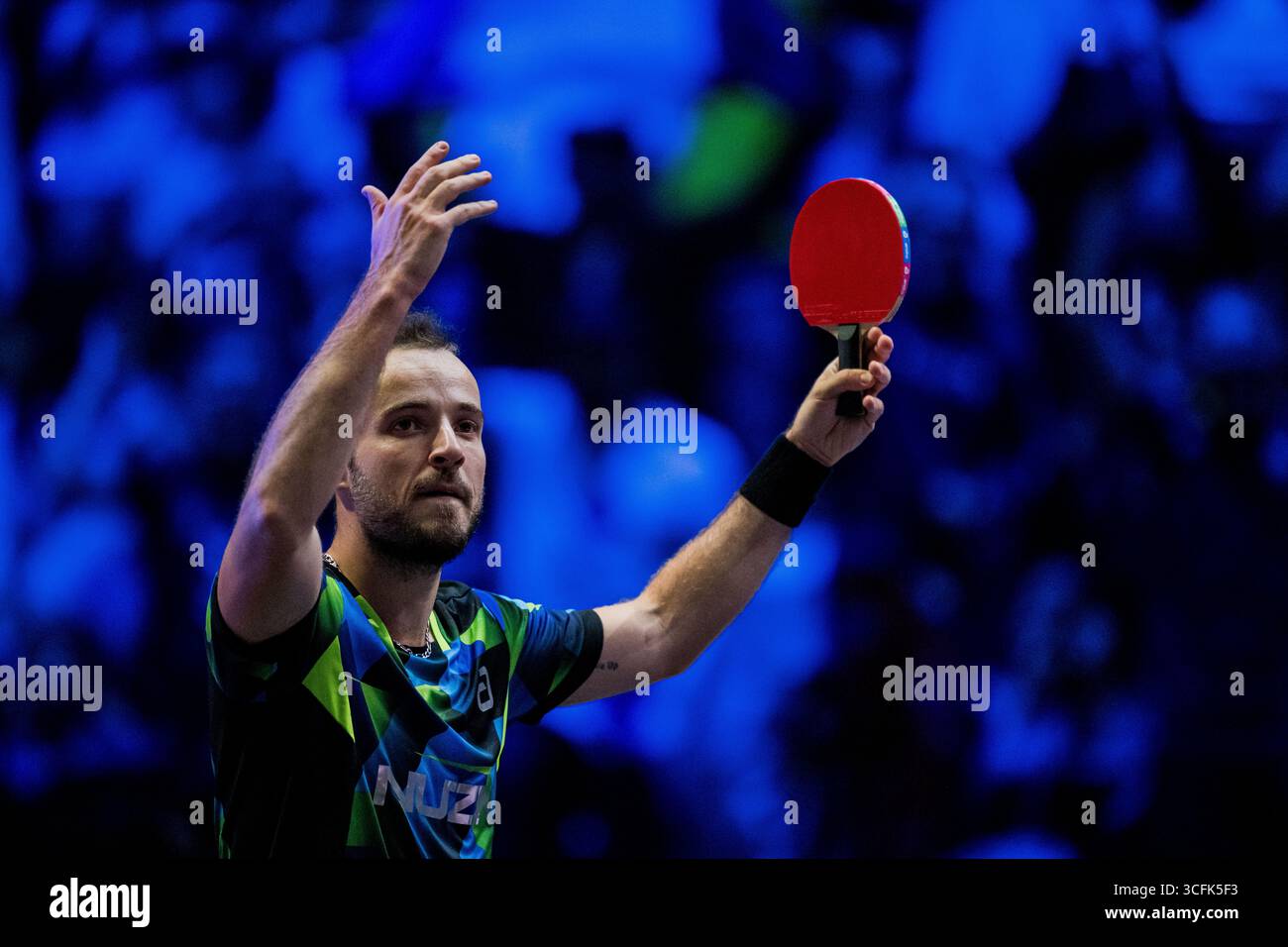 250823 Simon Gauzy of France celebrates during the men's doubles final ...