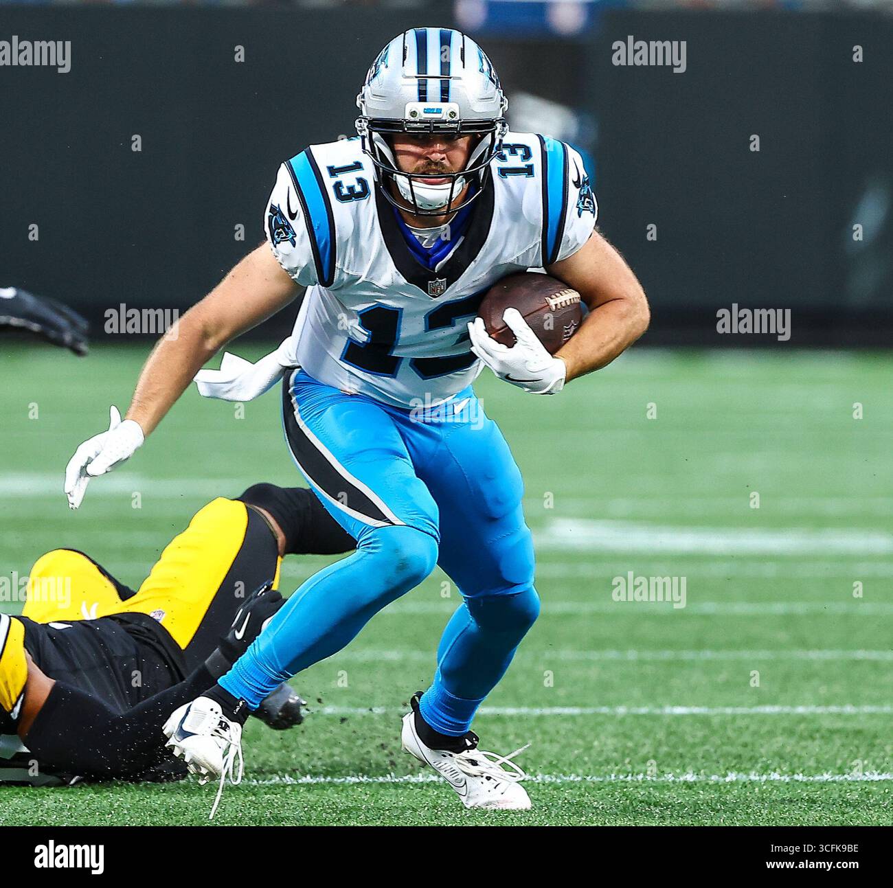 August 21, 2025: Panthers wide receiver Hunter Renfrow (13) avoids ...