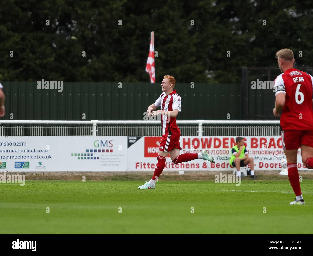 Brackley, UK. 23rd August 2025. Ryan Haynes of Brackley Town celebrates ...