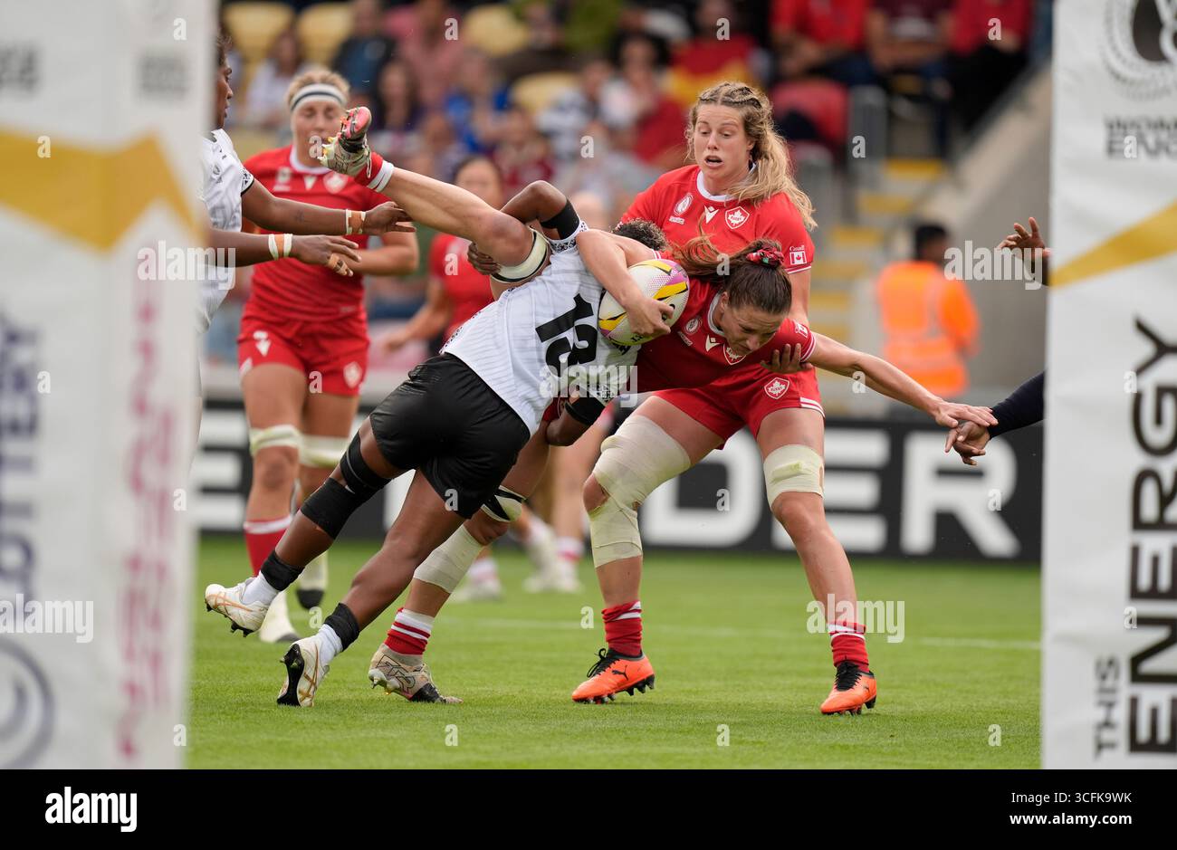 Canada's Gabrielle Senft is tackled by Fiji's Ema Adivitaloga during ...