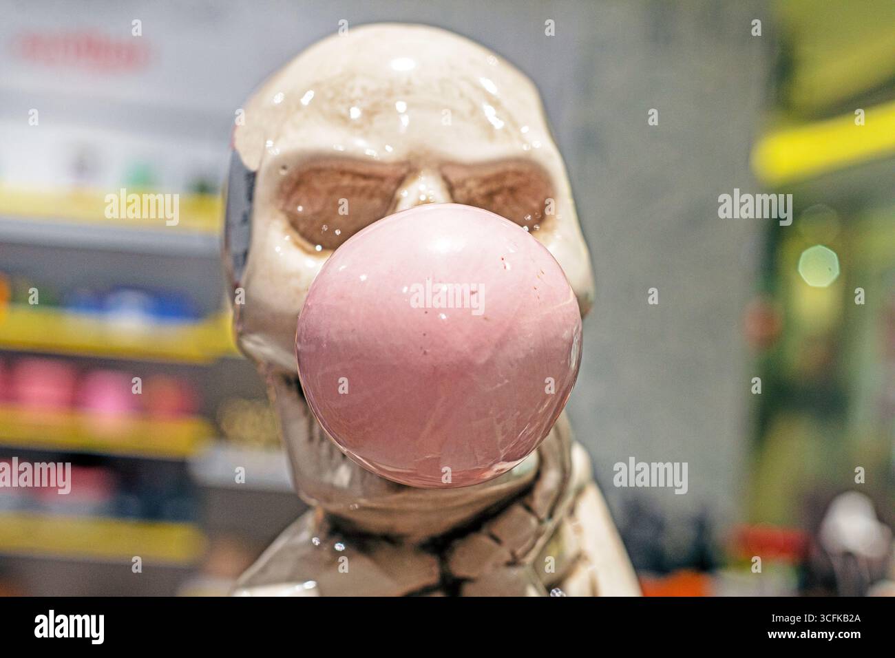 Skeleton blowing balloon hi-res stock photography and images - Alamy