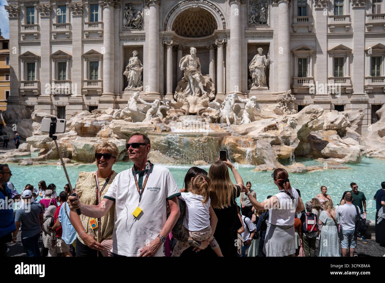 Daily Life in Rome People posing for a selfie at Trevi Fountain on May ...