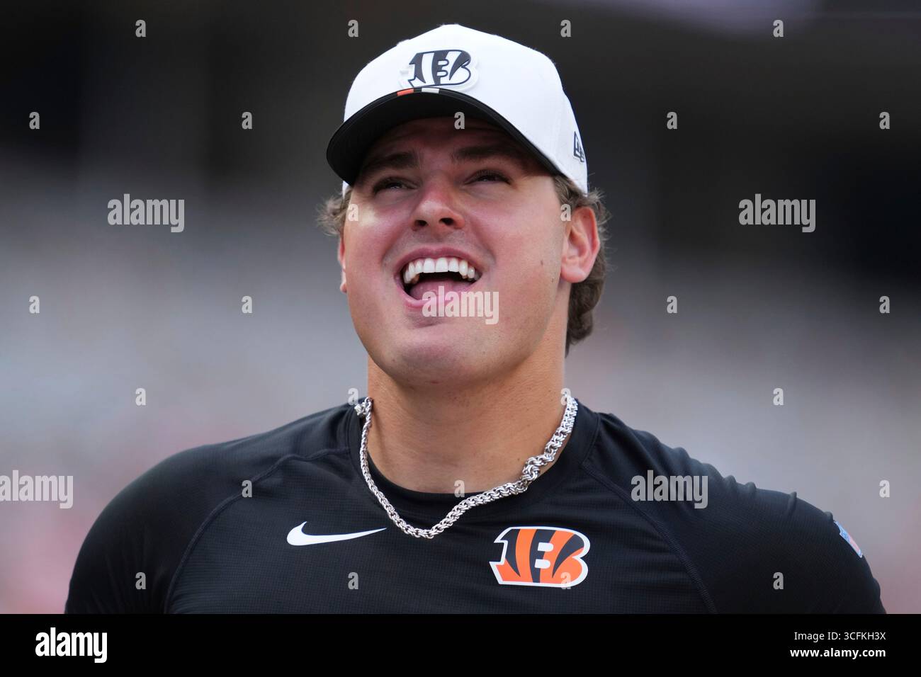 Cincinnati Bengals defensive end Trey Hendrickson runs off the field ...