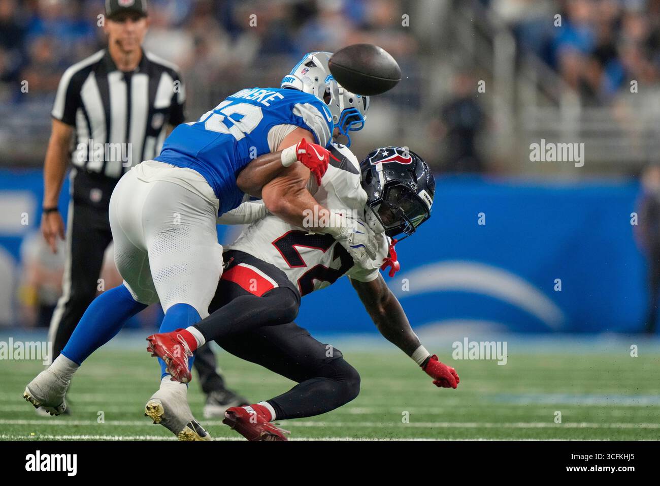 Detroit Lions linebacker Trevor Nowaske, left, breaks up a pass ...