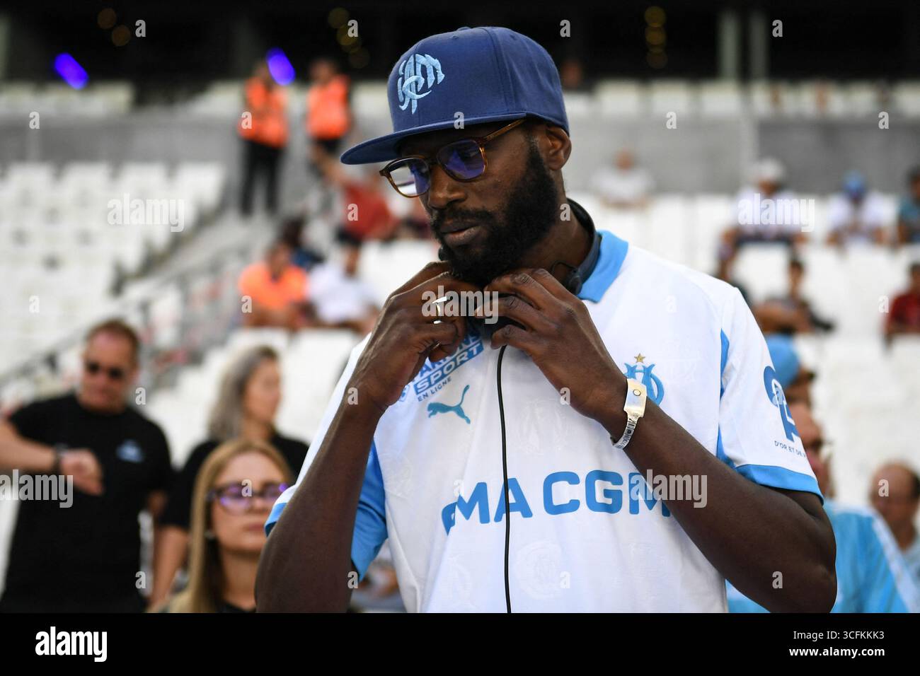 DJ DAZ performs before the French L1 football match between Olympique ...