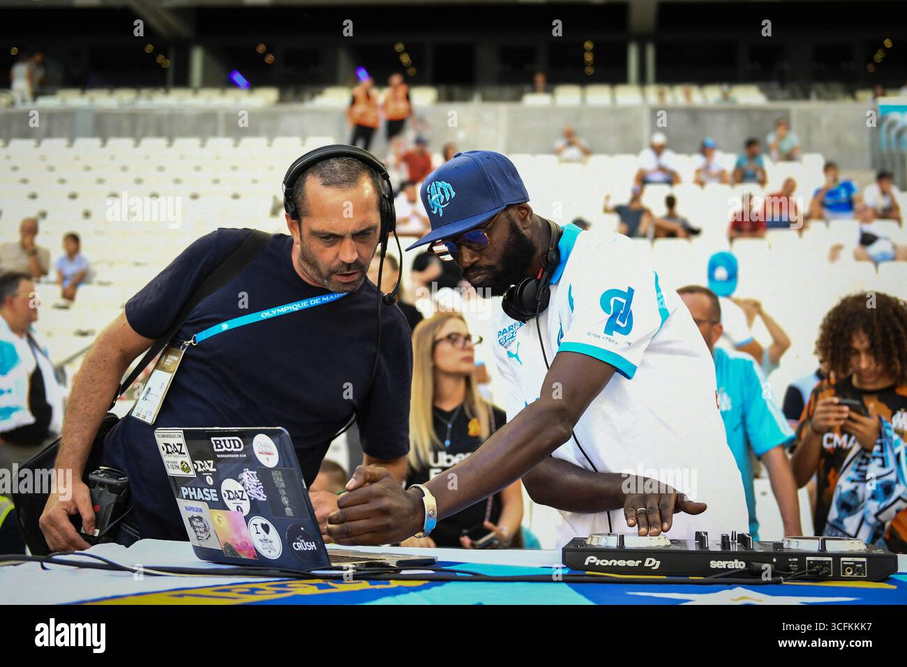 DJ DAZ performs before the French L1 football match between Olympique ...