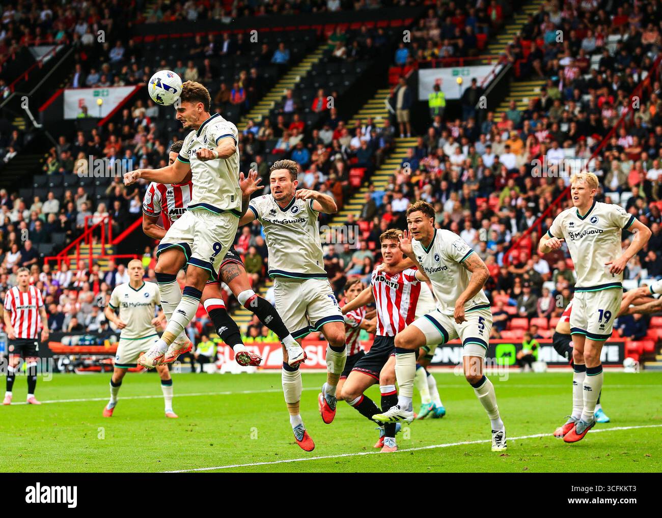 Mihailo Ivanovic of Millwall jumps up to win the high ball during the ...
