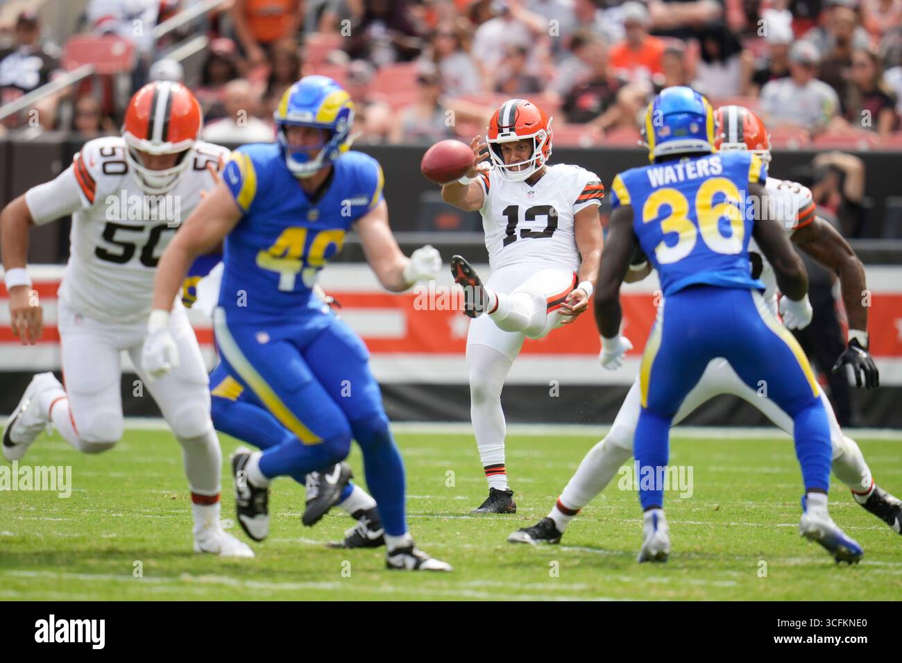 Cleveland Browns punter Corey Bojorquez (13) punts during the second ...