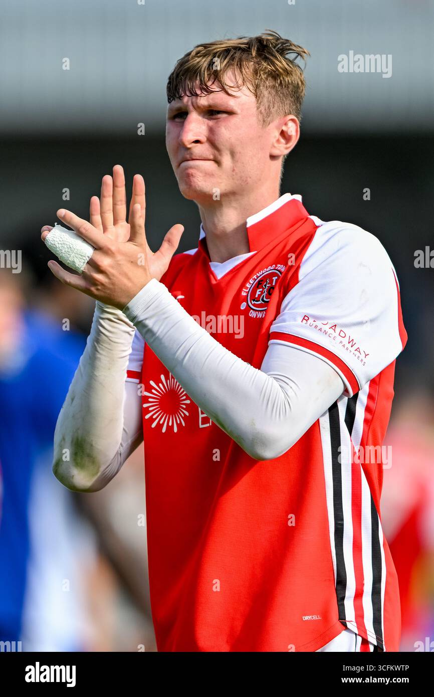 Finley Potter of Fleetwood Town acknowledges the home support during ...