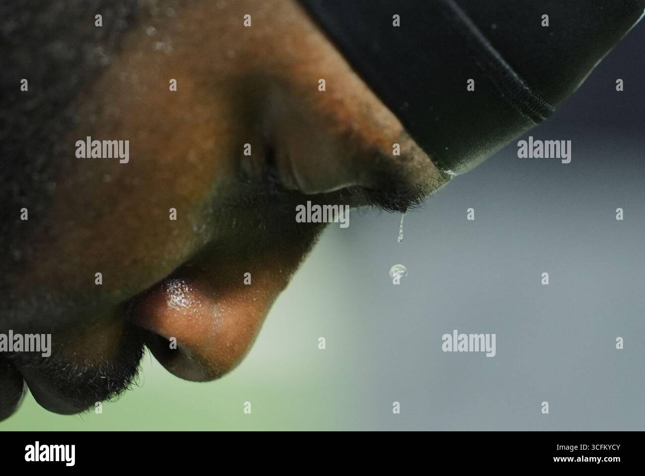Sweat drips from the face of Houston Texans linebacker E.J. Speed after ...