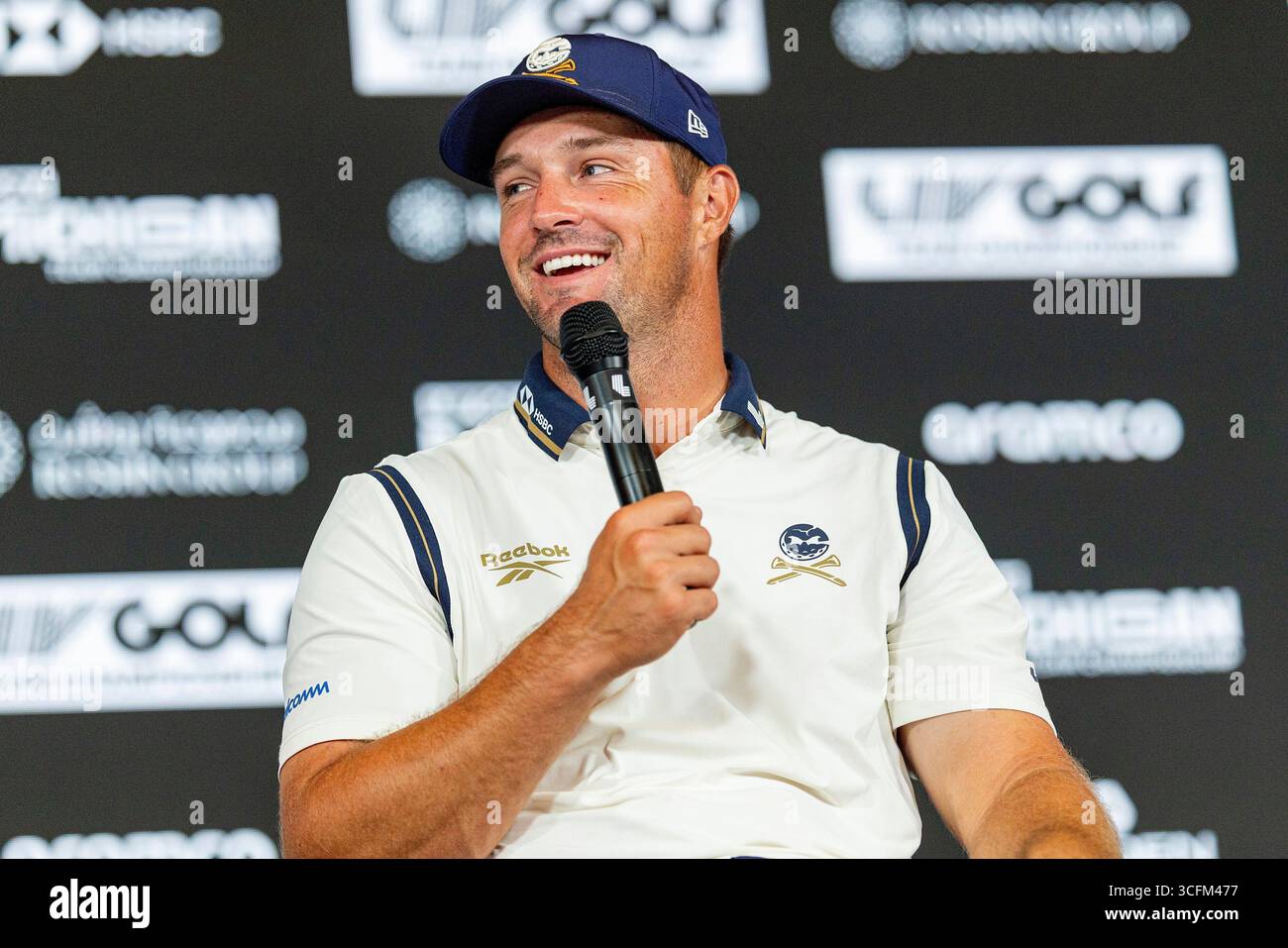 Captain Bryson DeChambeau, of Crushers GC, speaks at a news conference ...
