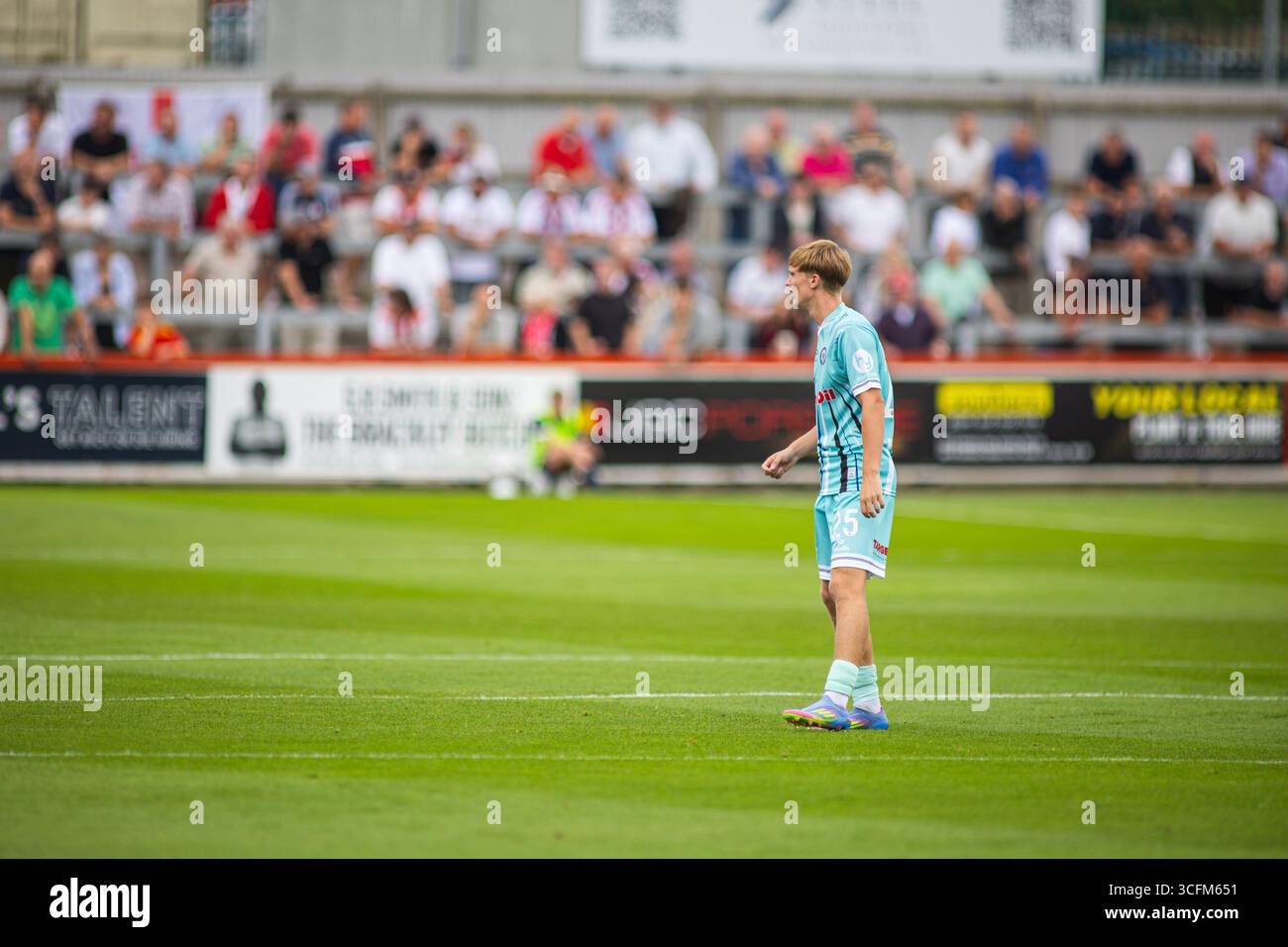 Brackley, UK. 23rd Aug 2025. Jack Griffiths (25 Rochdale AFC) looks on ...