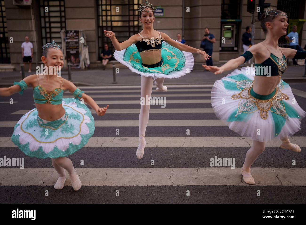 Dora, 10, left, Irina, 11, center, and Sandra, 12, of the Romanian ...