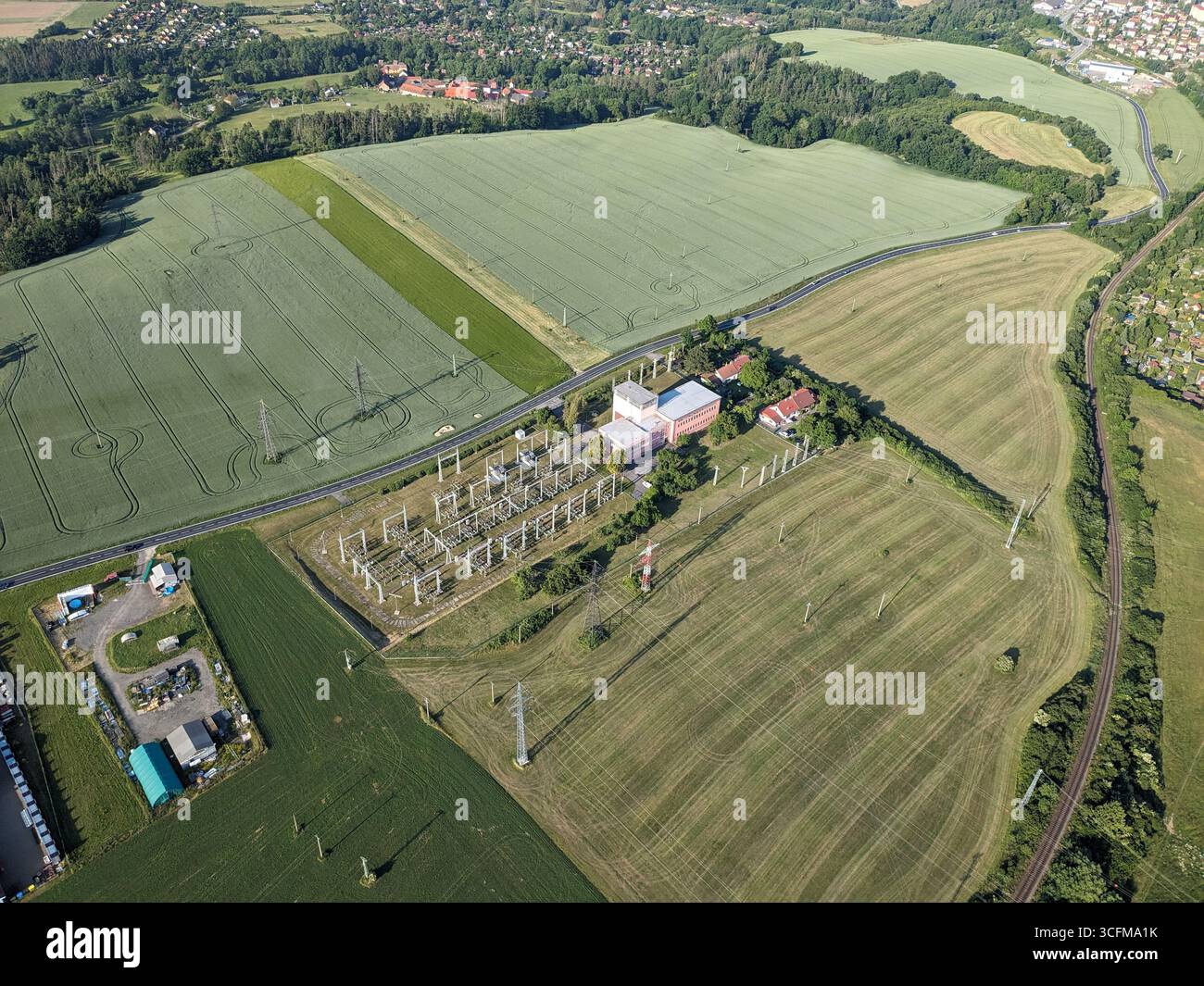 Electric substation aerial view with transformers and high-voltage ...