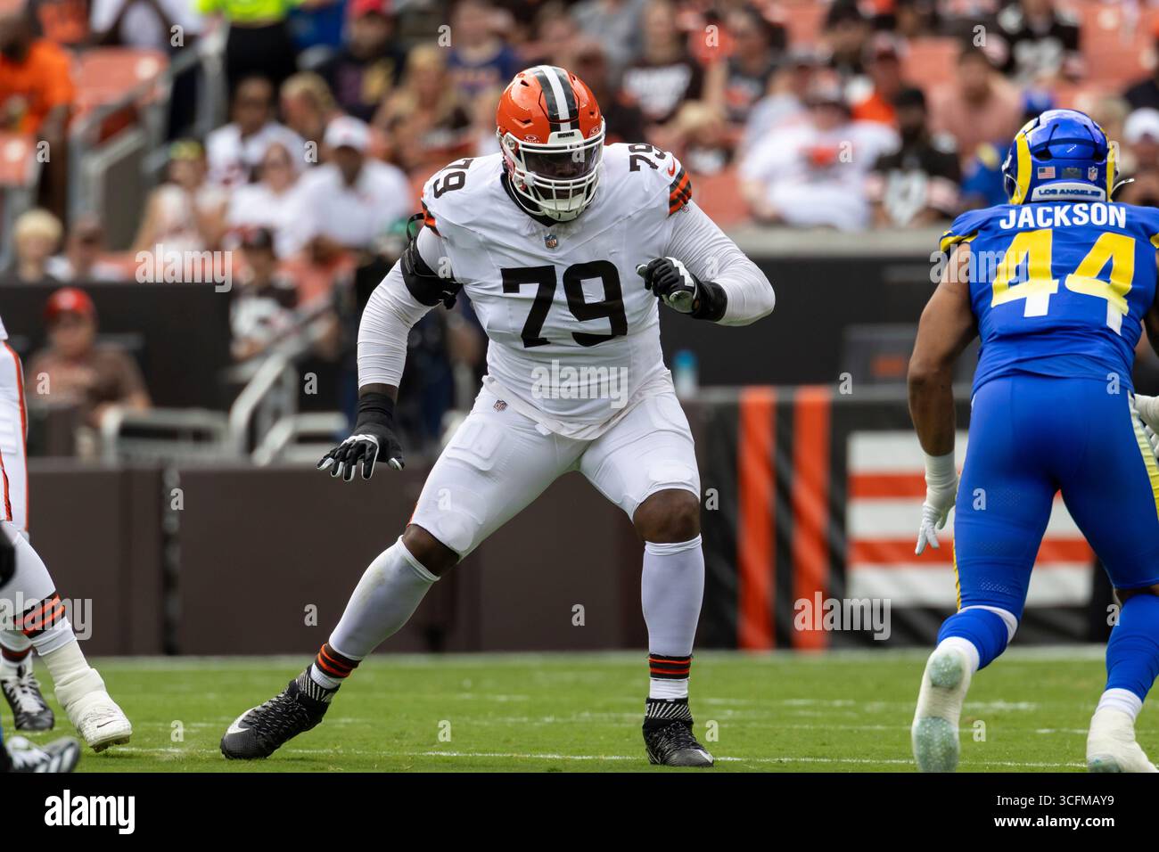 Cleveland Browns offensive tackle Dawand Jones (79) blocks during a pre ...