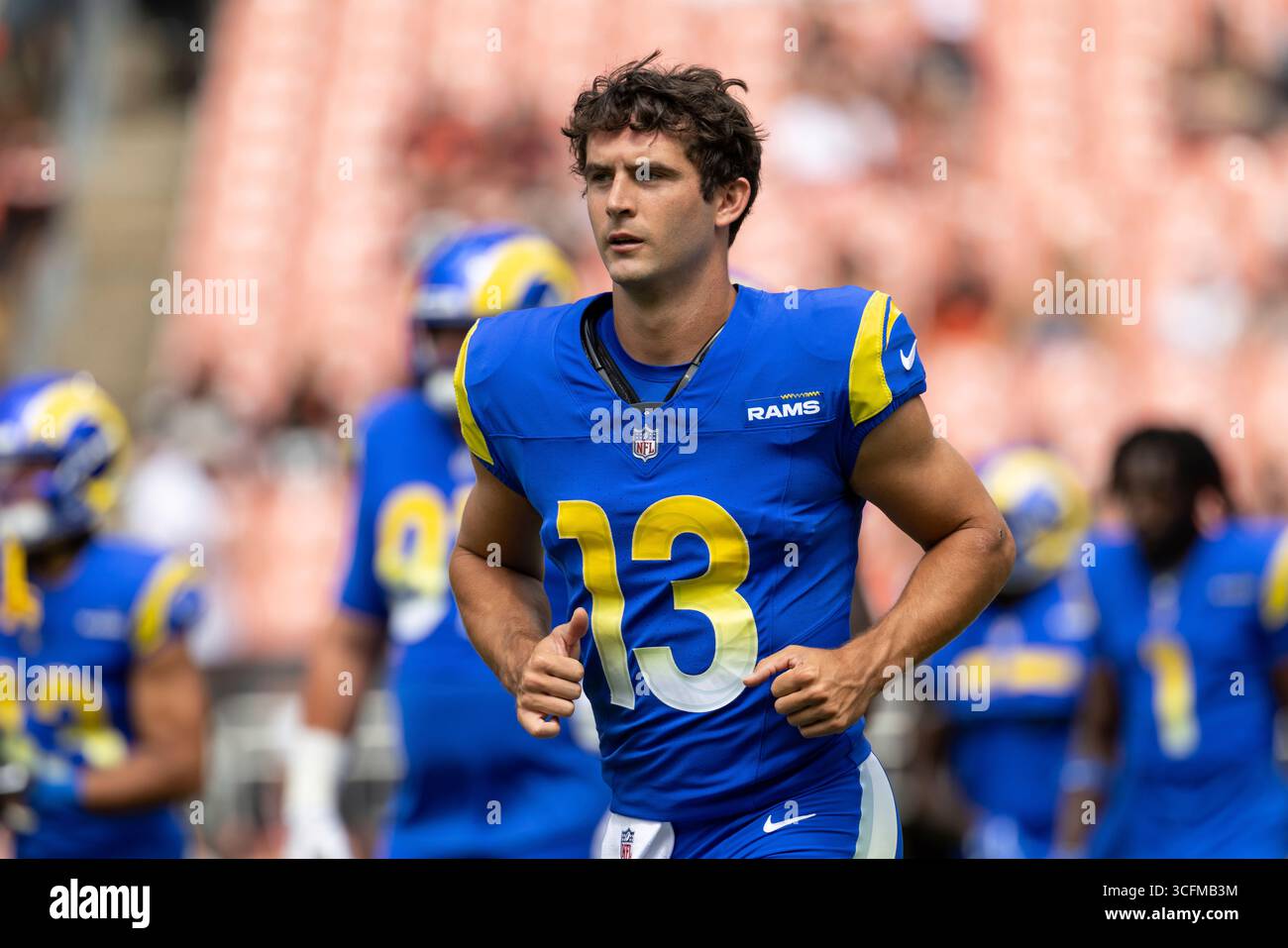 Los Angeles Rams quarterback Stetson Bennett IV (13) runs off the field ...