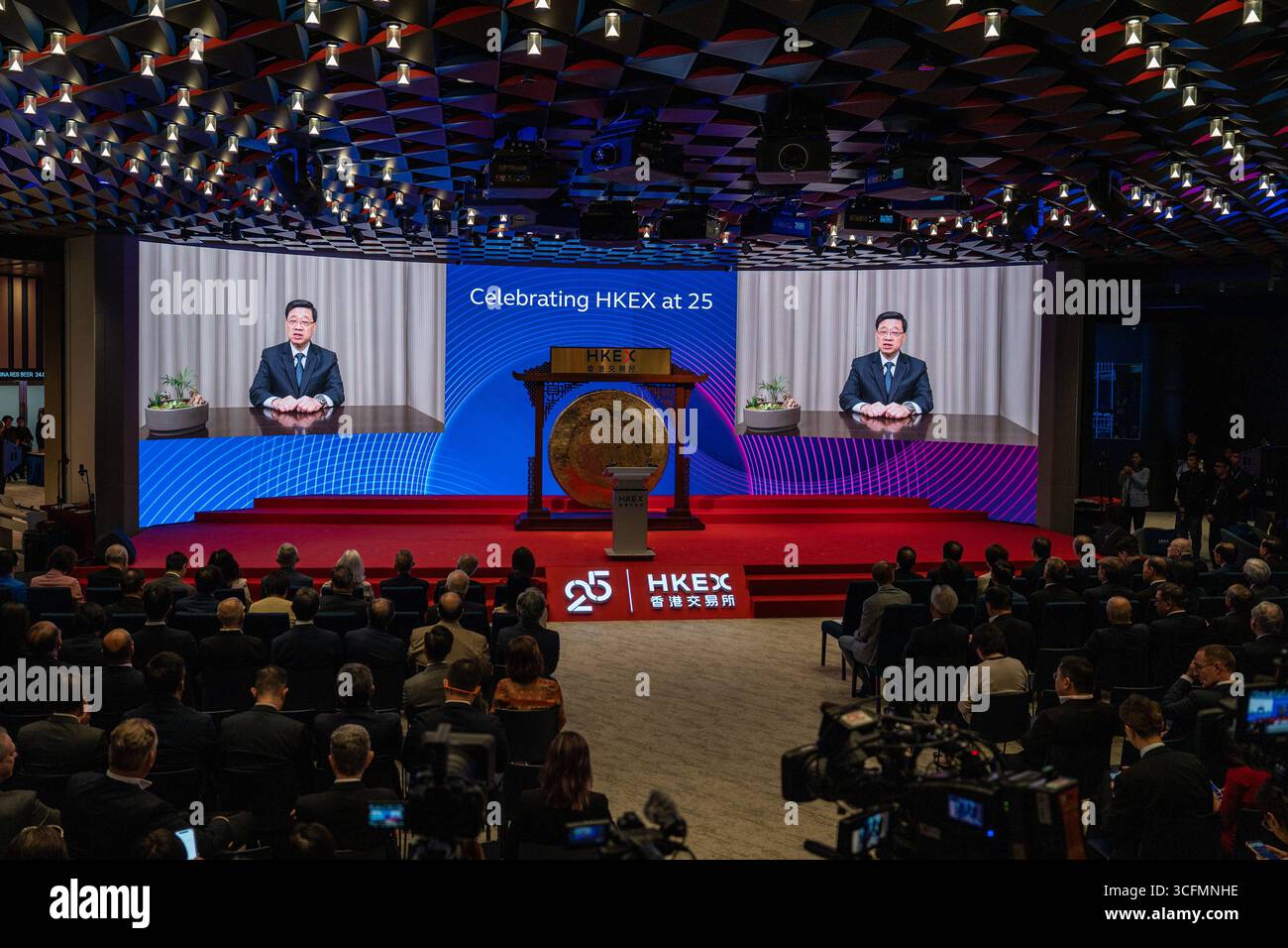 HKEX Marks it 25th Anniversary A screen showing Hong Kong Chief ...