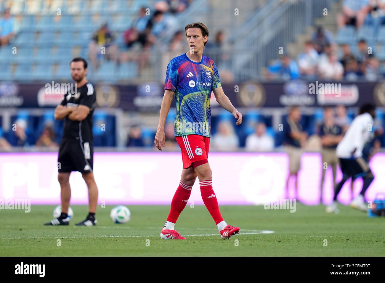 August 23, 2025: Chicago Fire Defender Jack Elliott (3) warms up before ...