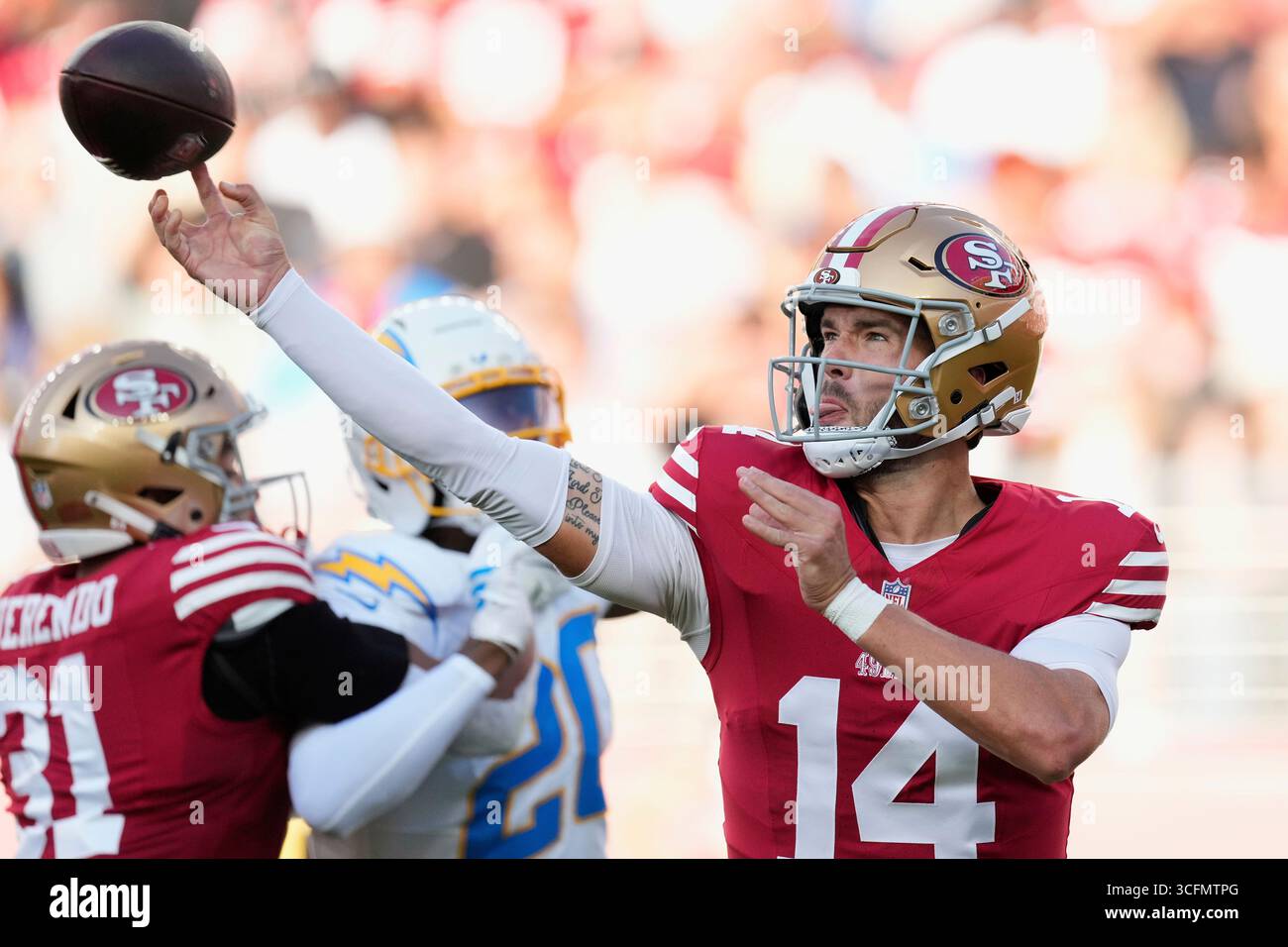 San Francisco 49ers quarterback Carter Bradley (14) passes against the ...