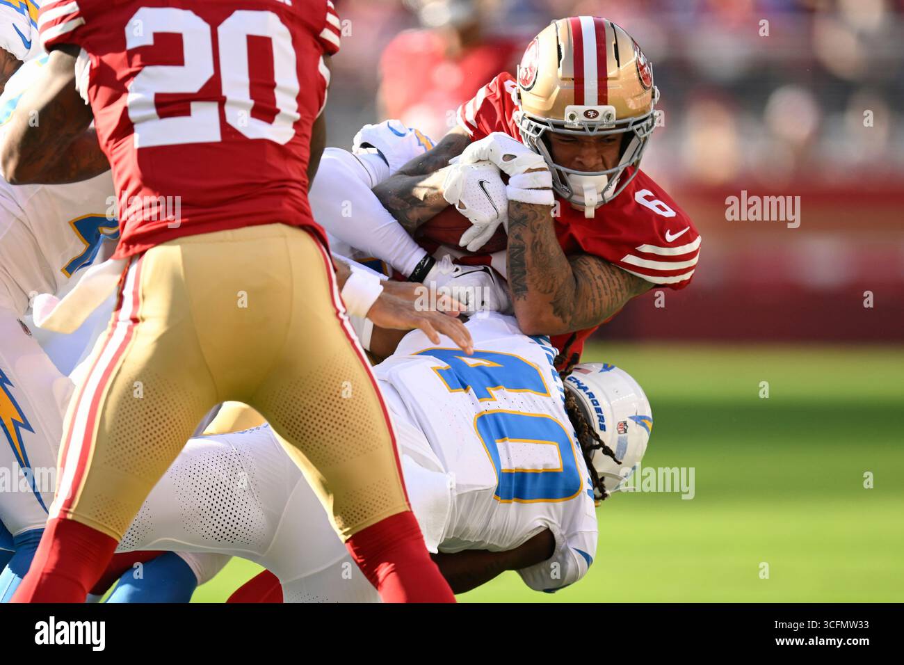 San Francisco 49ers' Skyy Moore (6) is tackled against the Los Angeles ...