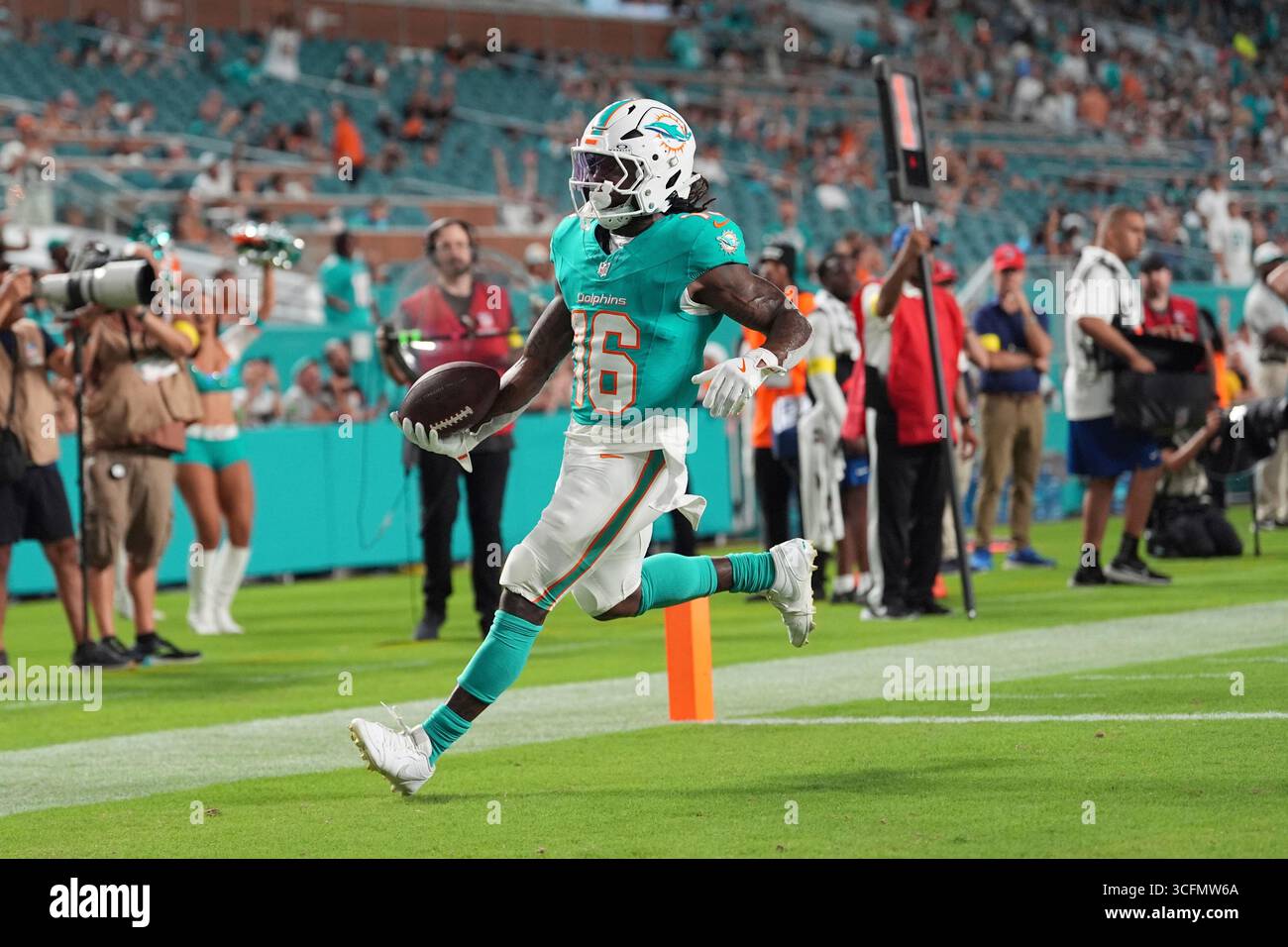 Miami Dolphins running back Mike Boone (16) scores a touchdown during ...