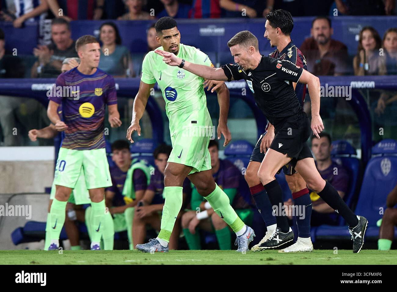 Referee Alejandro Hernandez gestures for a penalty following a VAR ...