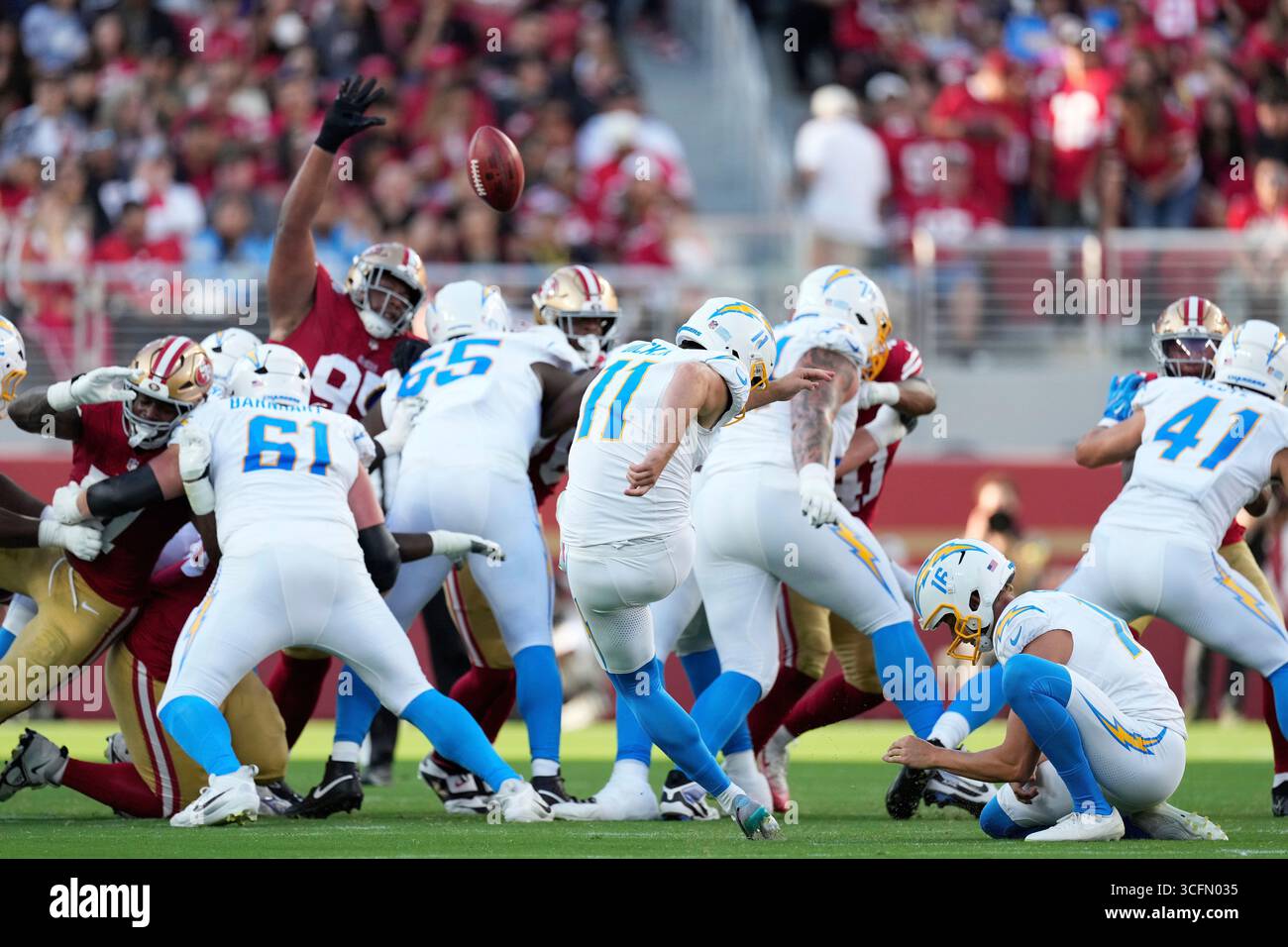 Los Angeles Chargers place kicker Cameron Dicker (11) kicks against the ...