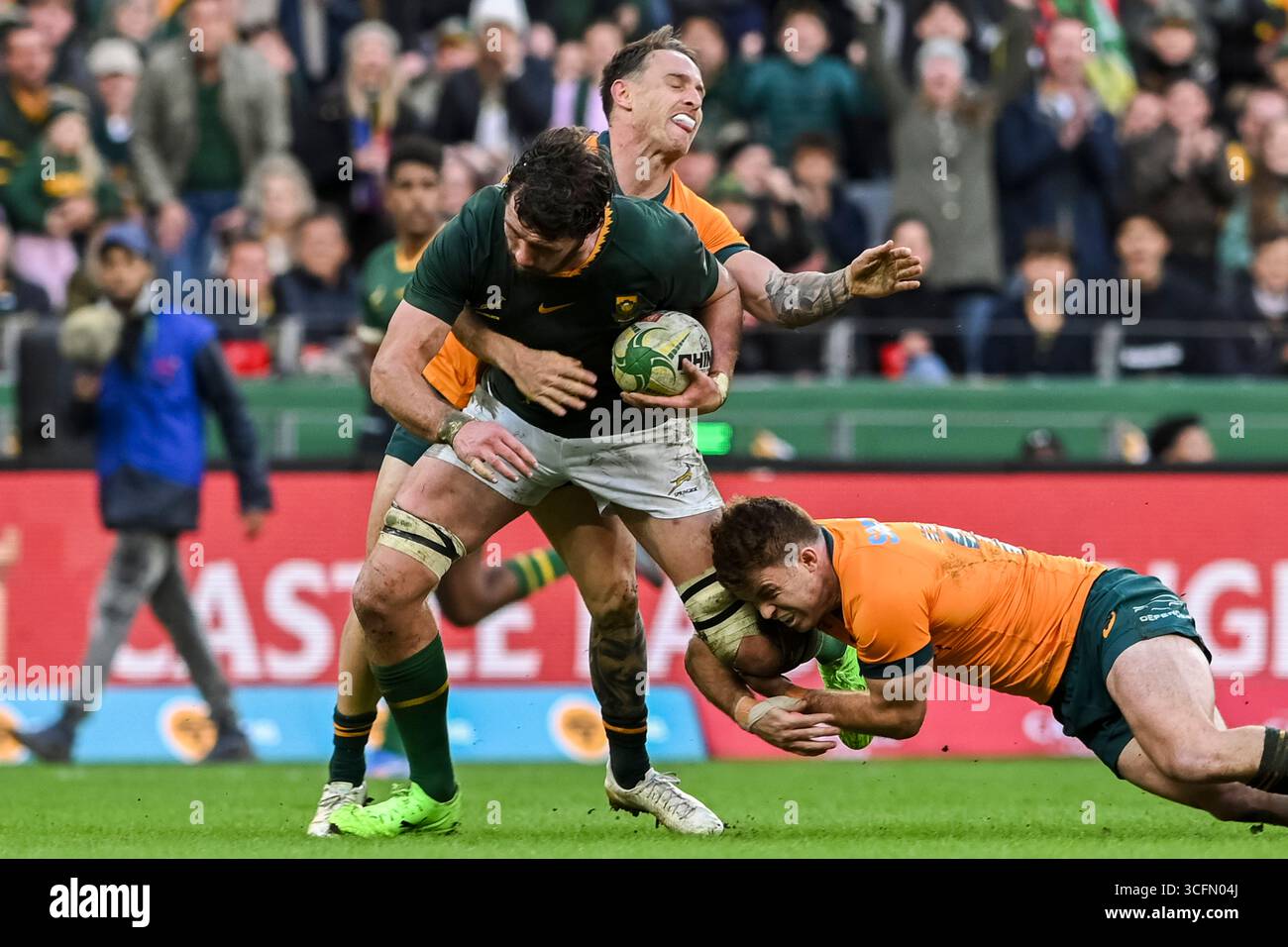 Ruan Nortje of South Africa tackled by Corey Toole of Australia during ...