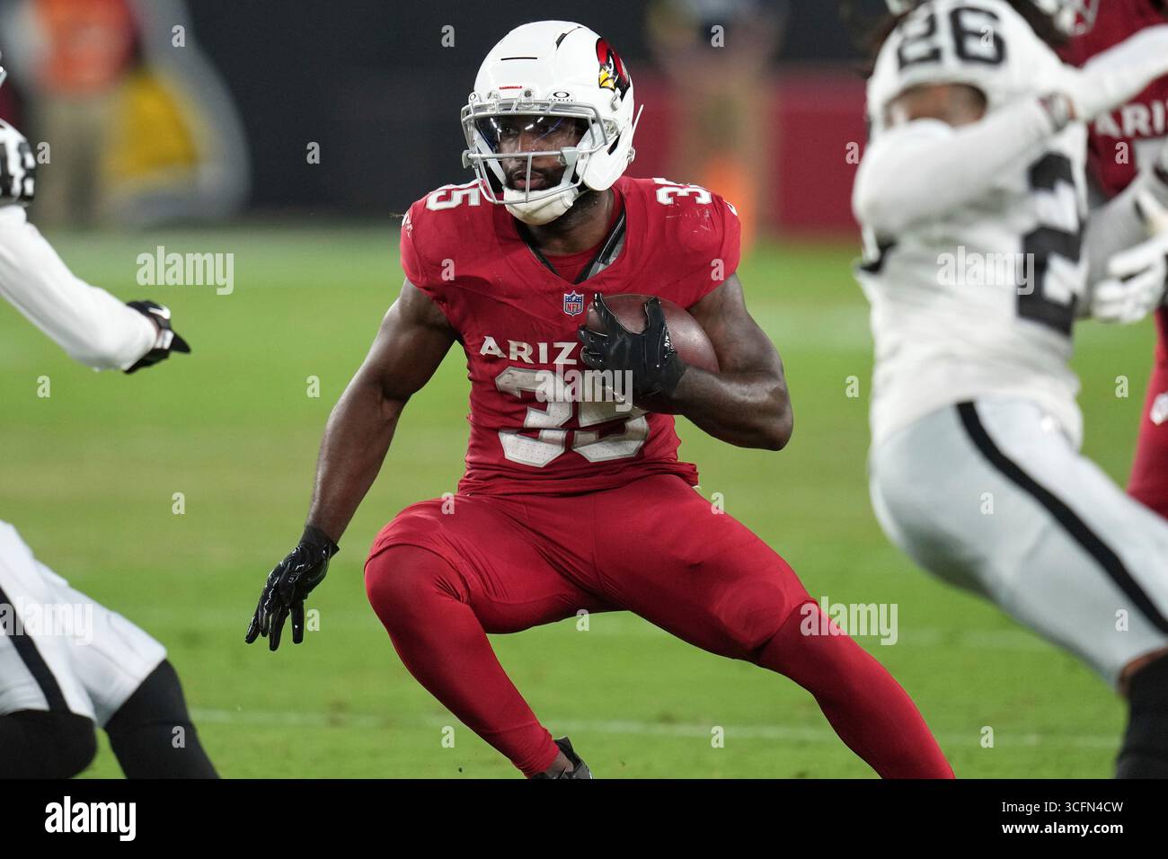 Arizona Cardinals running back Bam Knight (35) runs the ball agaisnt ...