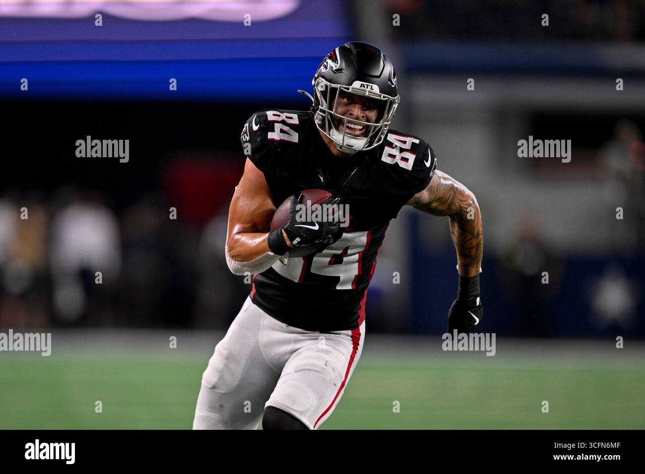 Atlanta Falcons tight end Feleipe Franks (84) runs with the ball during ...