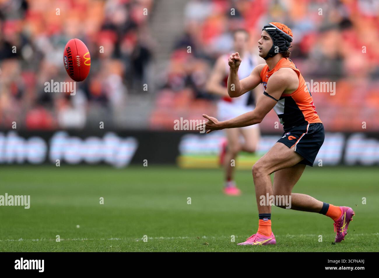 Darcy Jones of the GWS Giants passes the ball during the NRL Round 25 ...