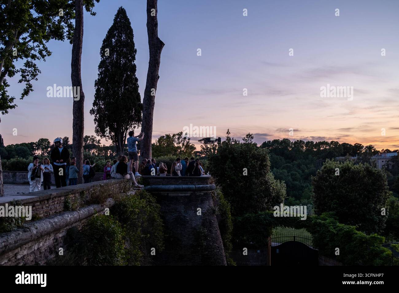 Daily Life in Rome People looking at the sunset on Janiculum Hill on ...