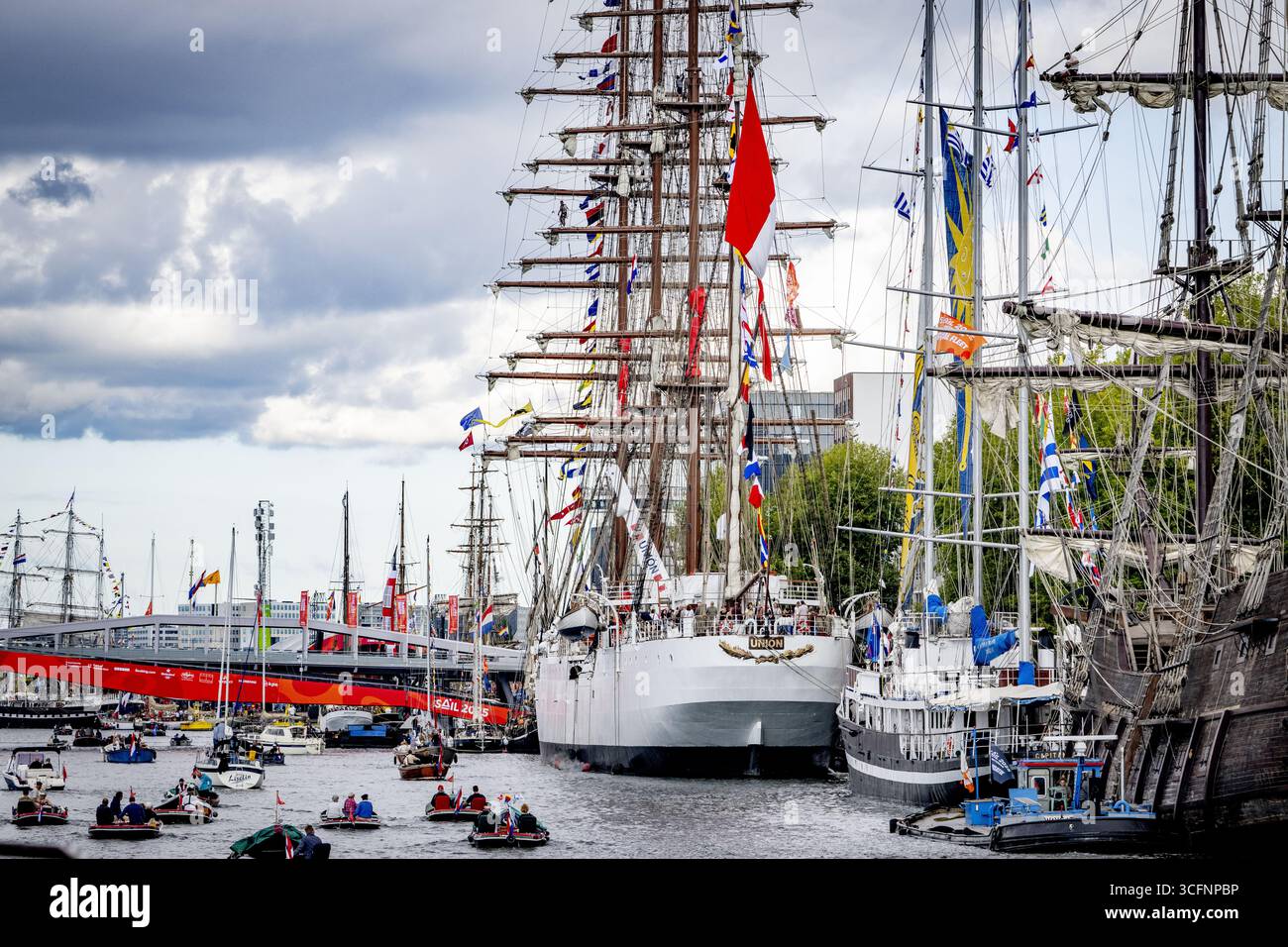 AMSTERDAM - Visitors and ships during Sail in Amsterdam. The tenth ...