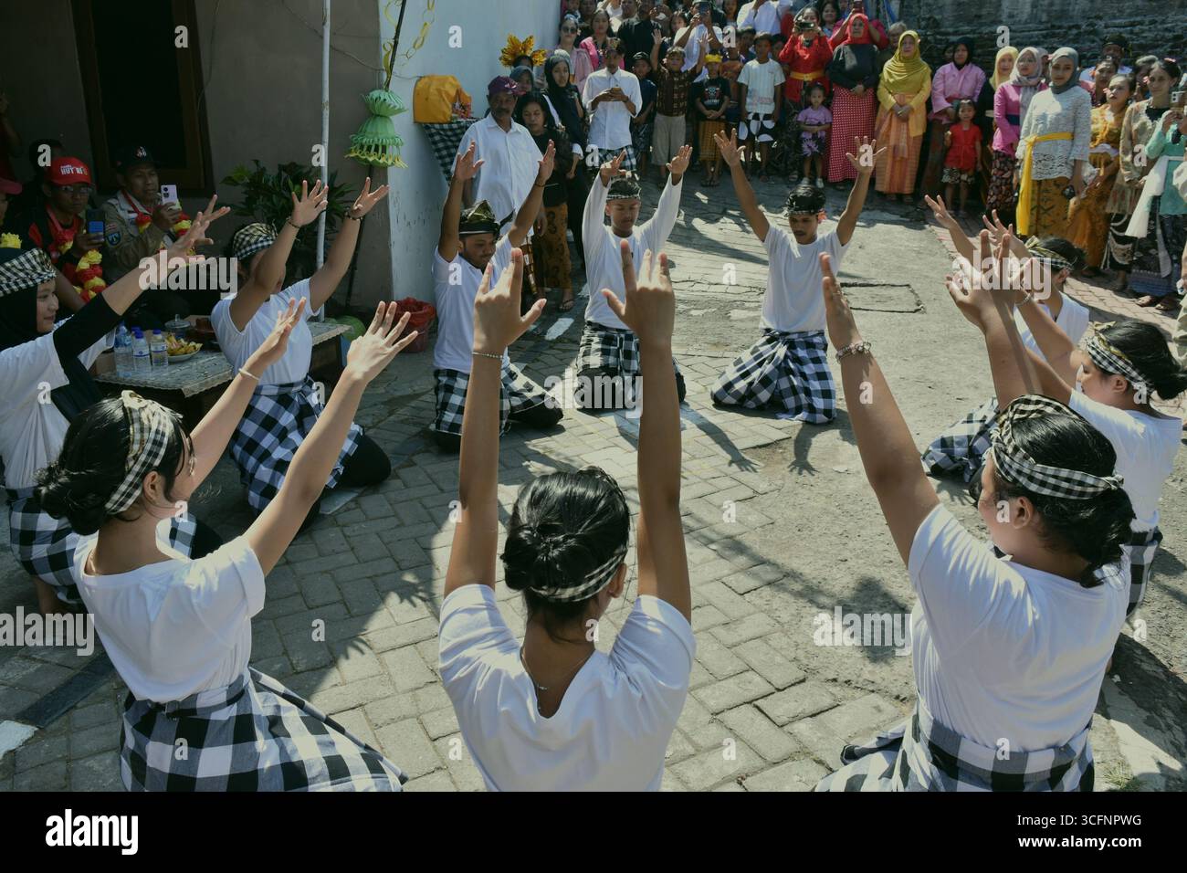 Residents look at the ''Balinese culture'' themed village with Balinese ...