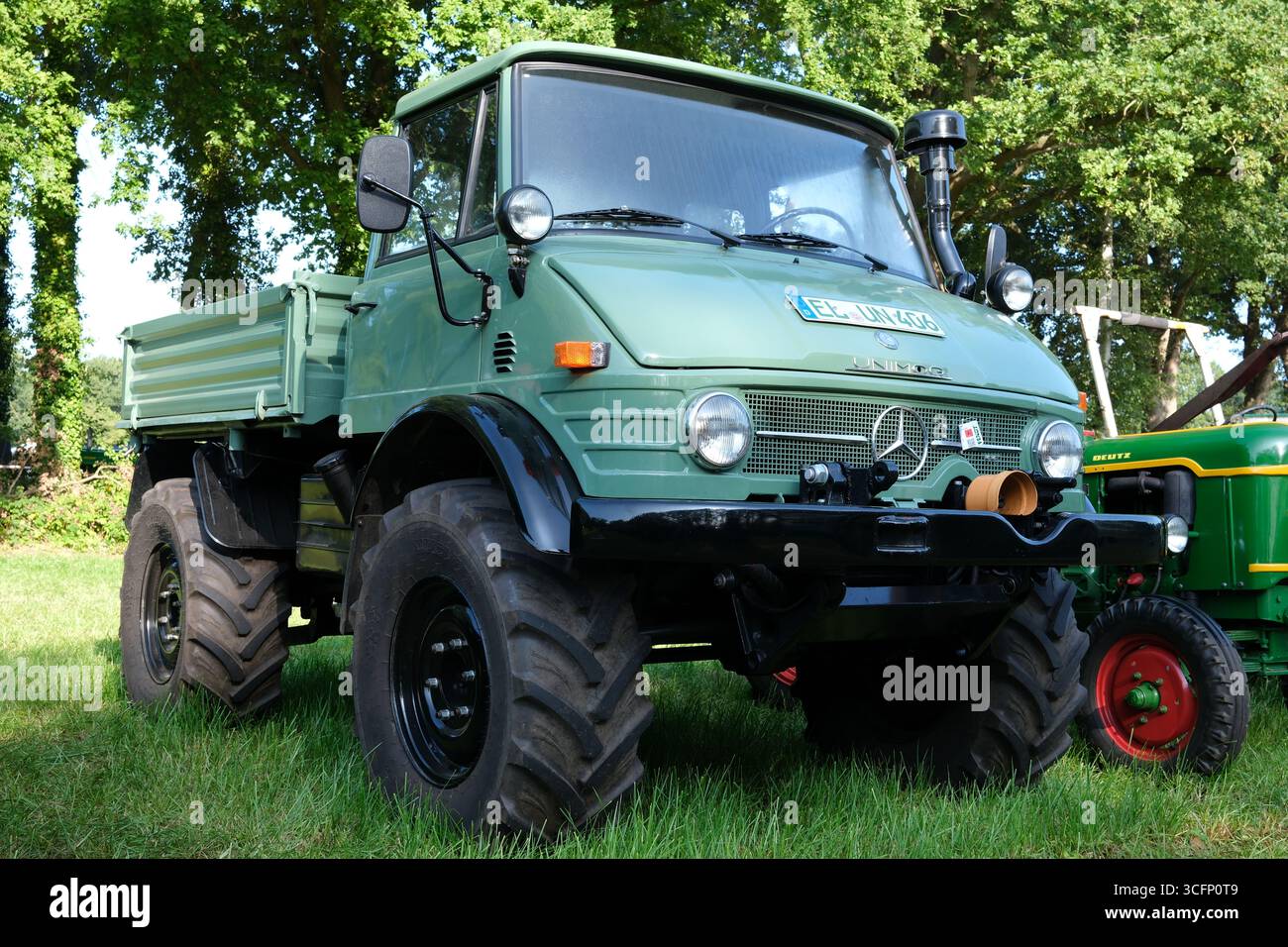 Nordhorn, Germany Aug 10 2025 A green Mercedes Unimog 406. Unimog is a ...