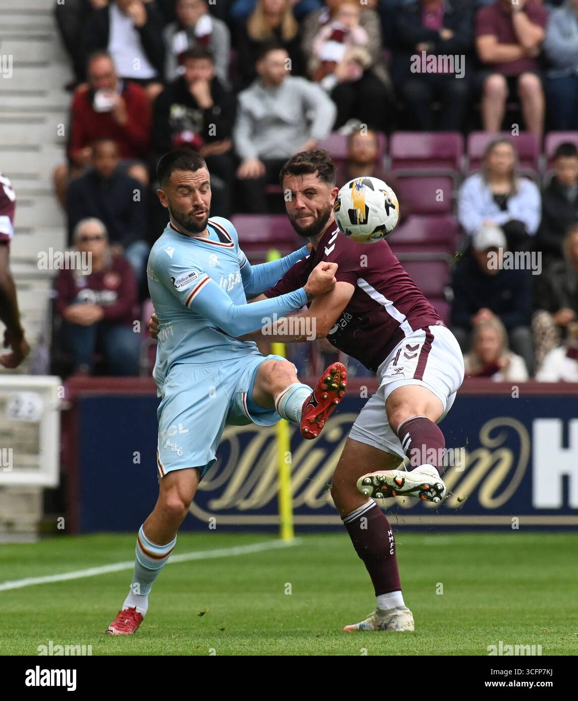Apostolos stamatelopoulos motherwell tussle with hearts craig halkett r ...