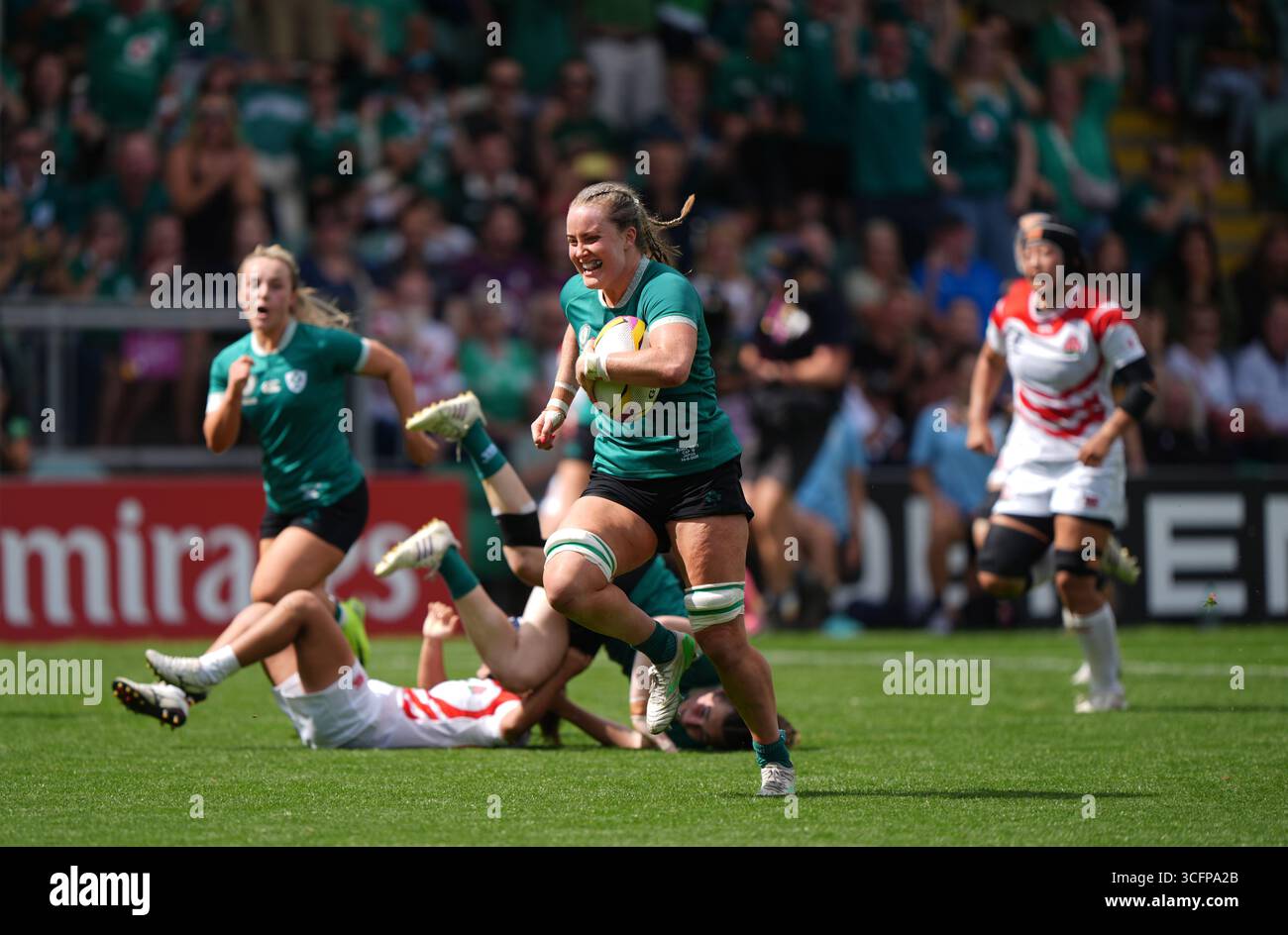 Ireland's Fiona Tuite breaks away to score her sides fourth try during ...