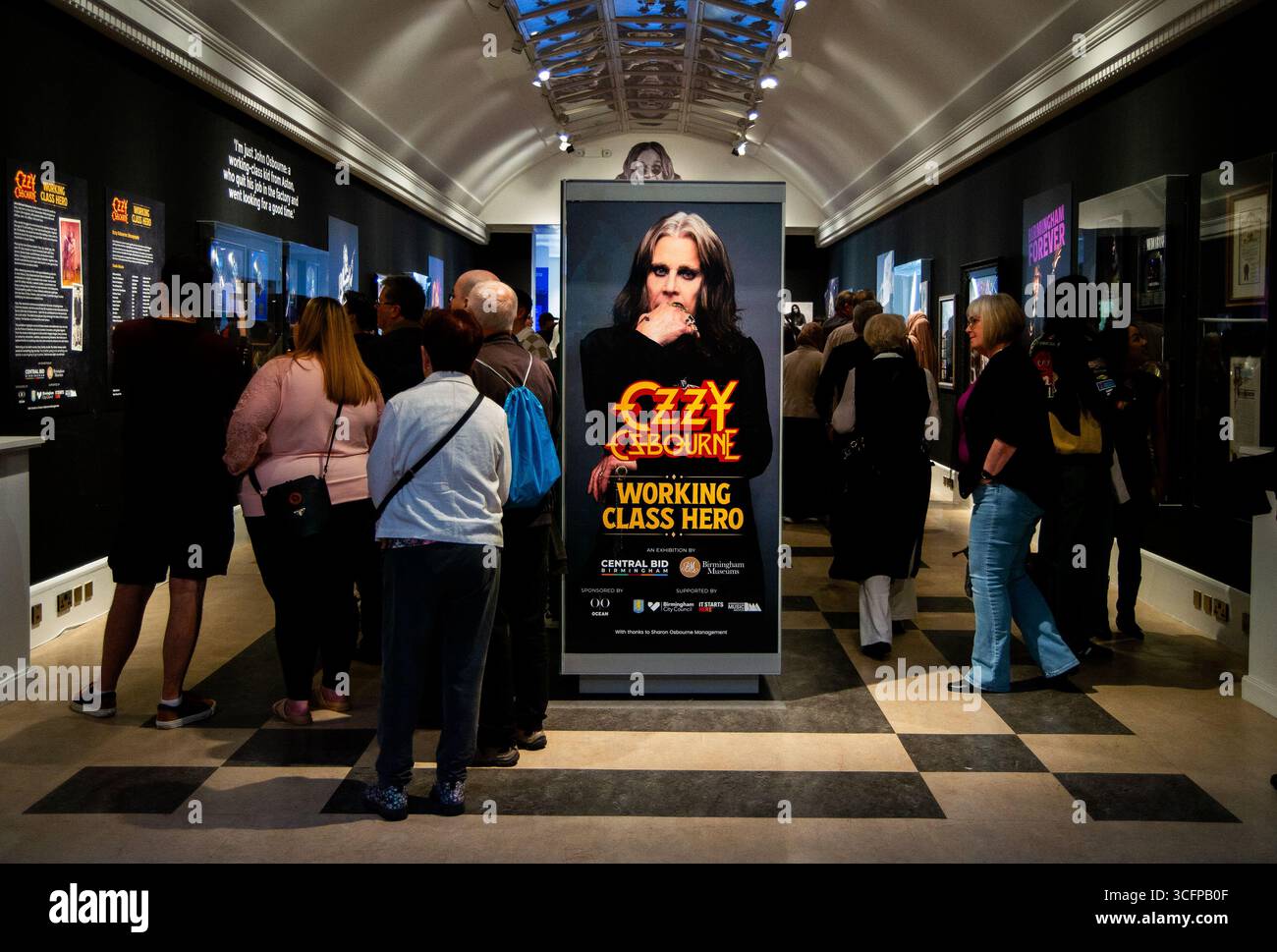 People looking around the Ozzy Osbourne - Working Class Hero ...