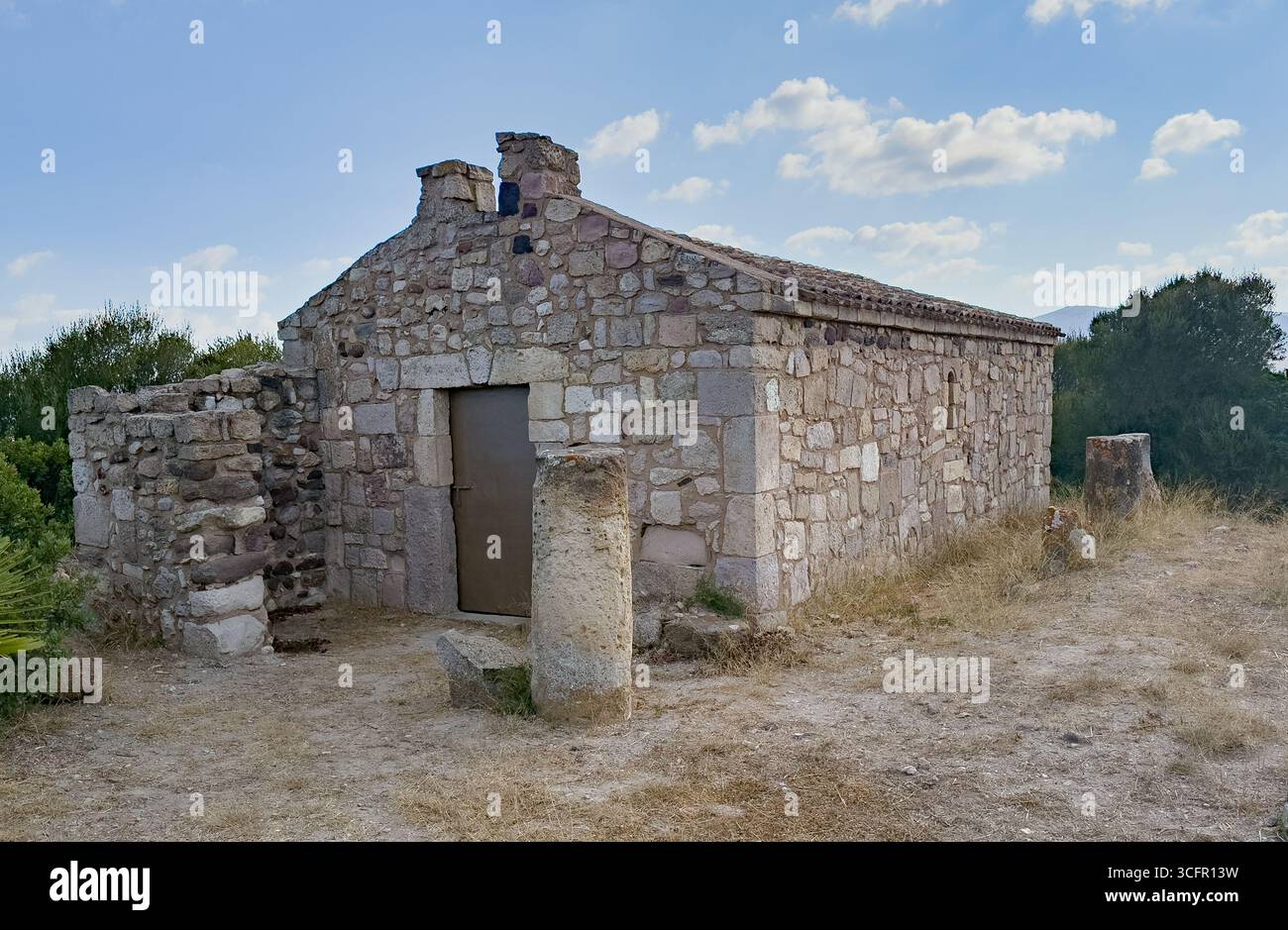 Old small Christian chapel built of stone blocks with tiled roof ...