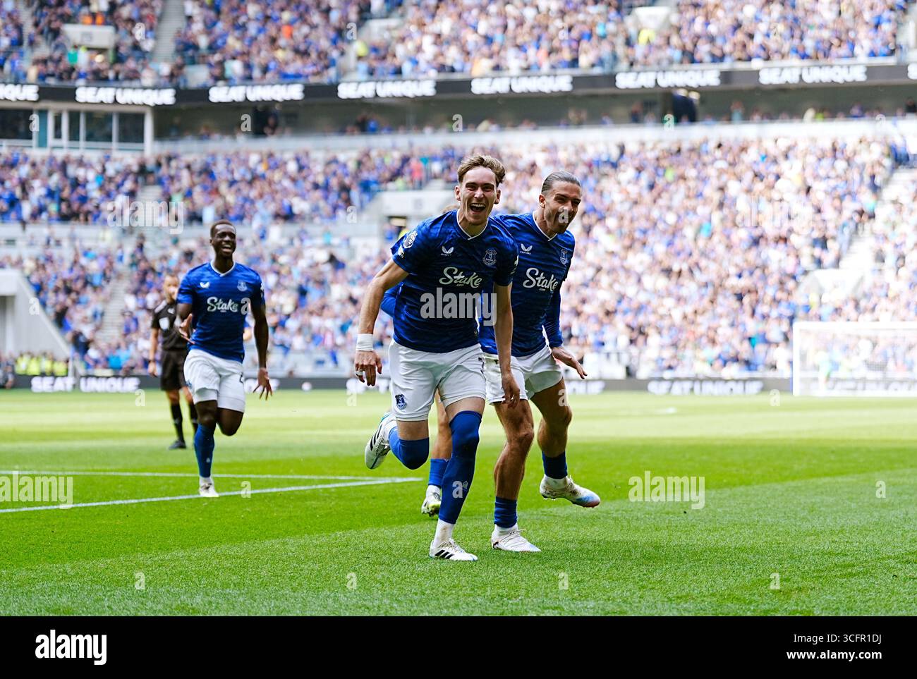 Everton's James Garner (centre) celebrates scoring their side's second ...