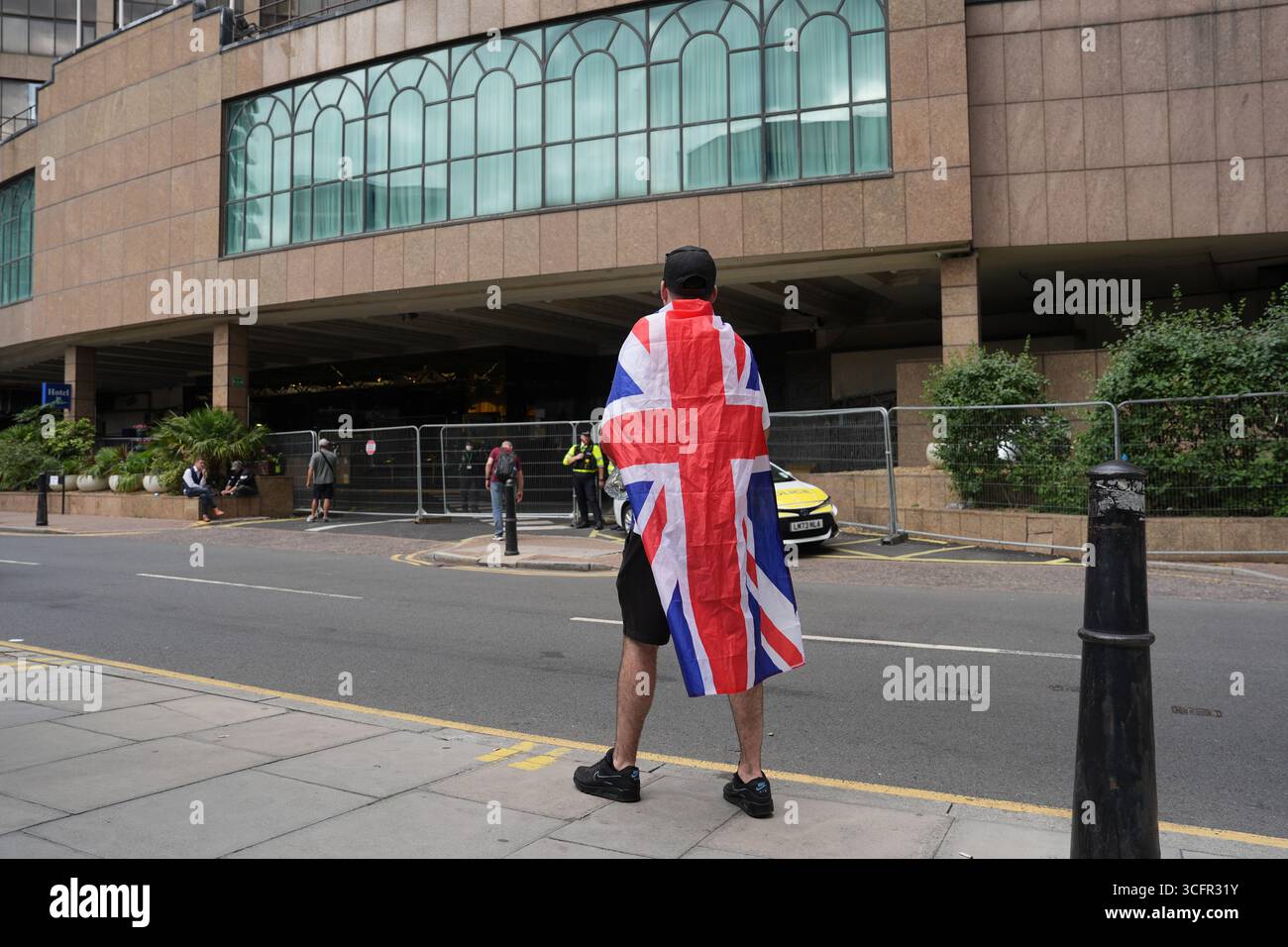 People demonstrating under the Abolish Asylum System slogan outside the ...
