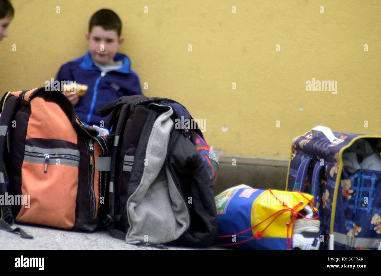 school child with school bag or school satchel on the back school child ...