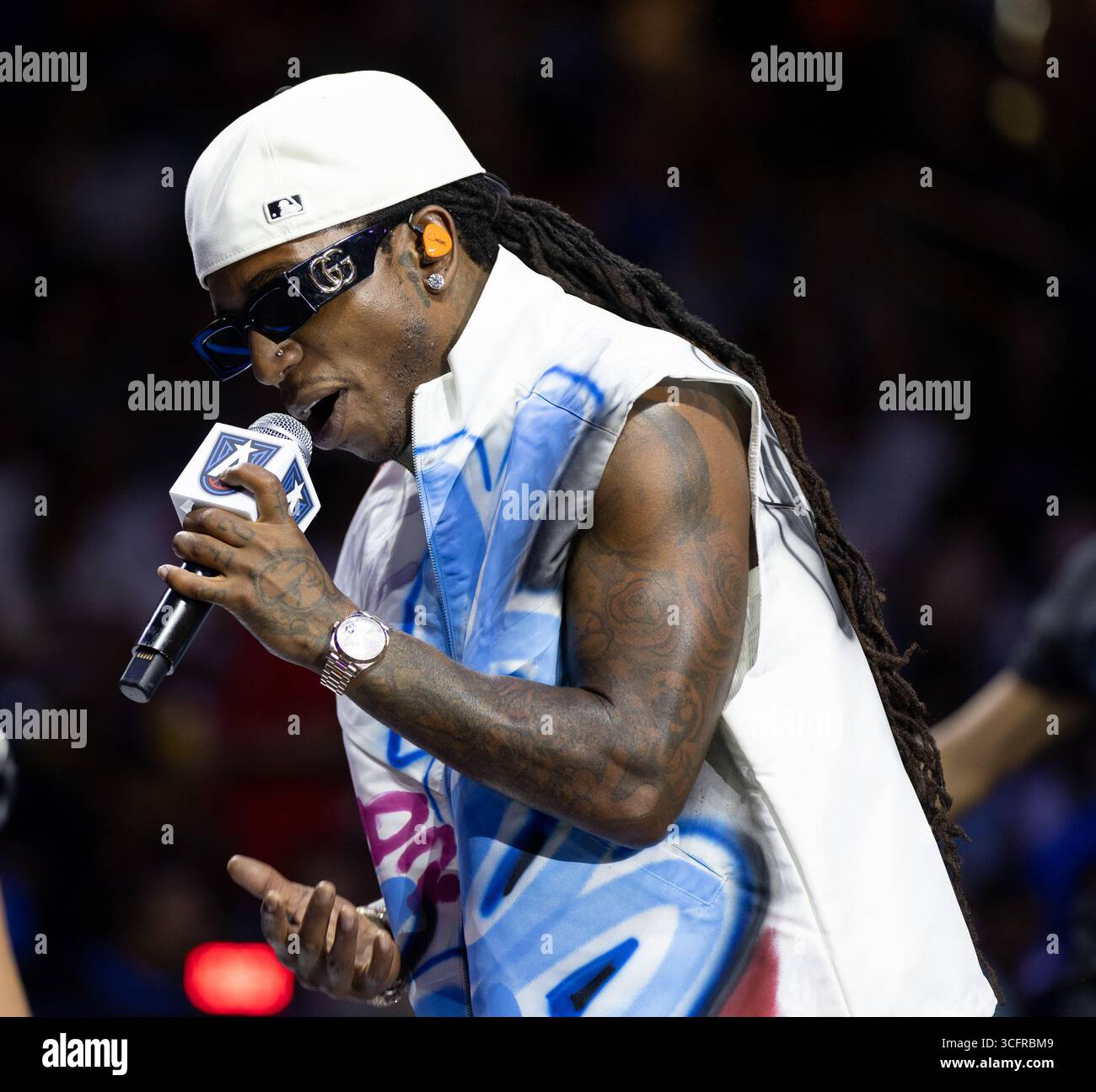 Singer Jacquees performs at halftime during the basketball game between ...