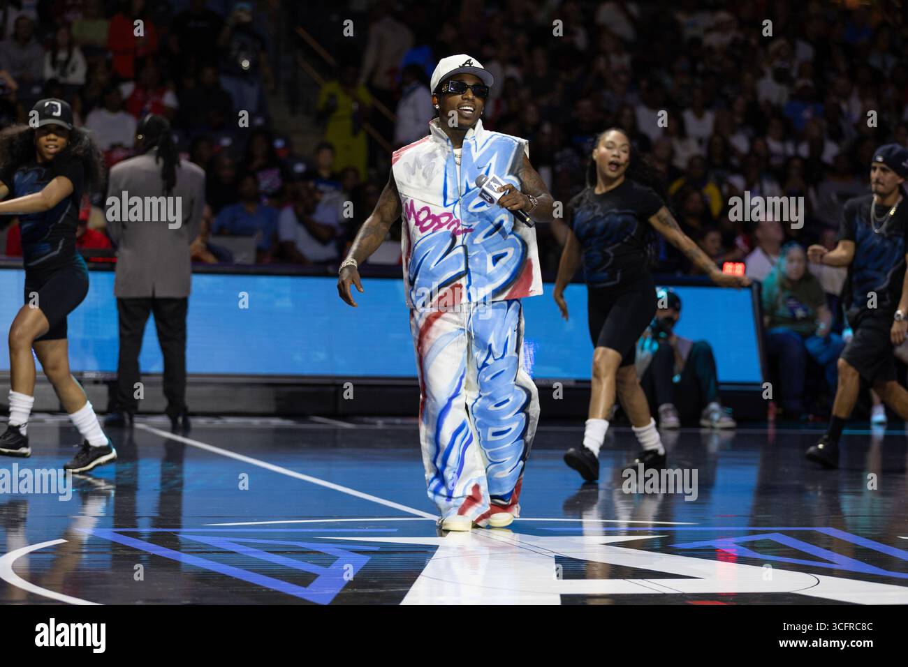 Singer Jacquees performs at halftime during the basketball game between ...