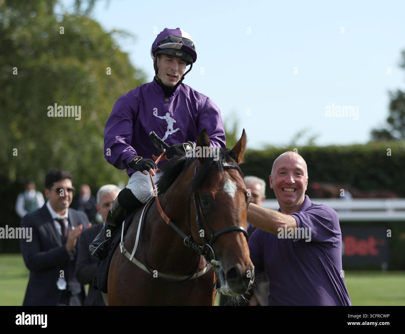 Ancient Egypt ridden by jockey Rowan Scott in the winner's enclosure ...