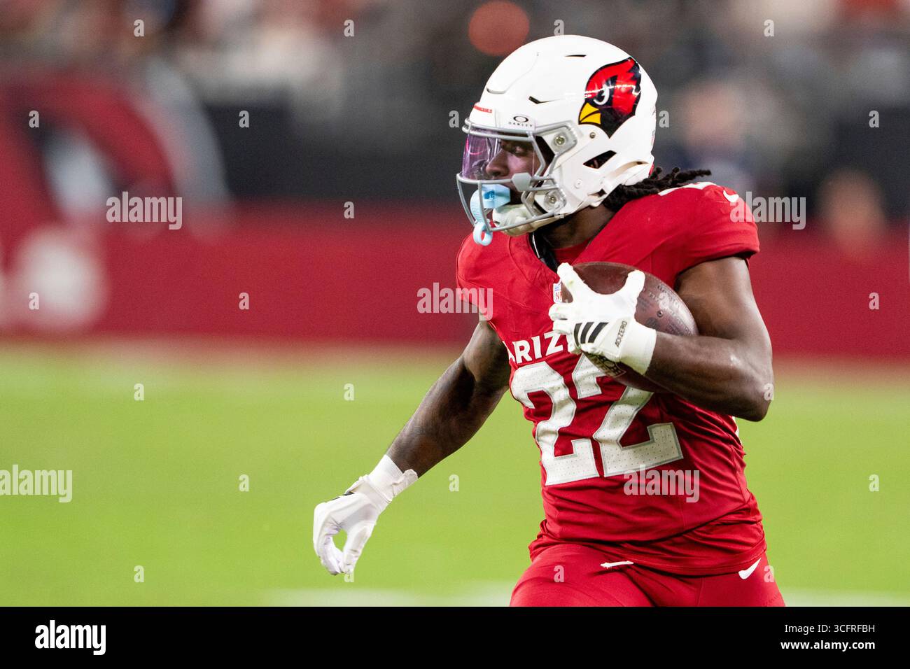 Arizona Cardinals running back Michael Carter (22) runs with the ball ...