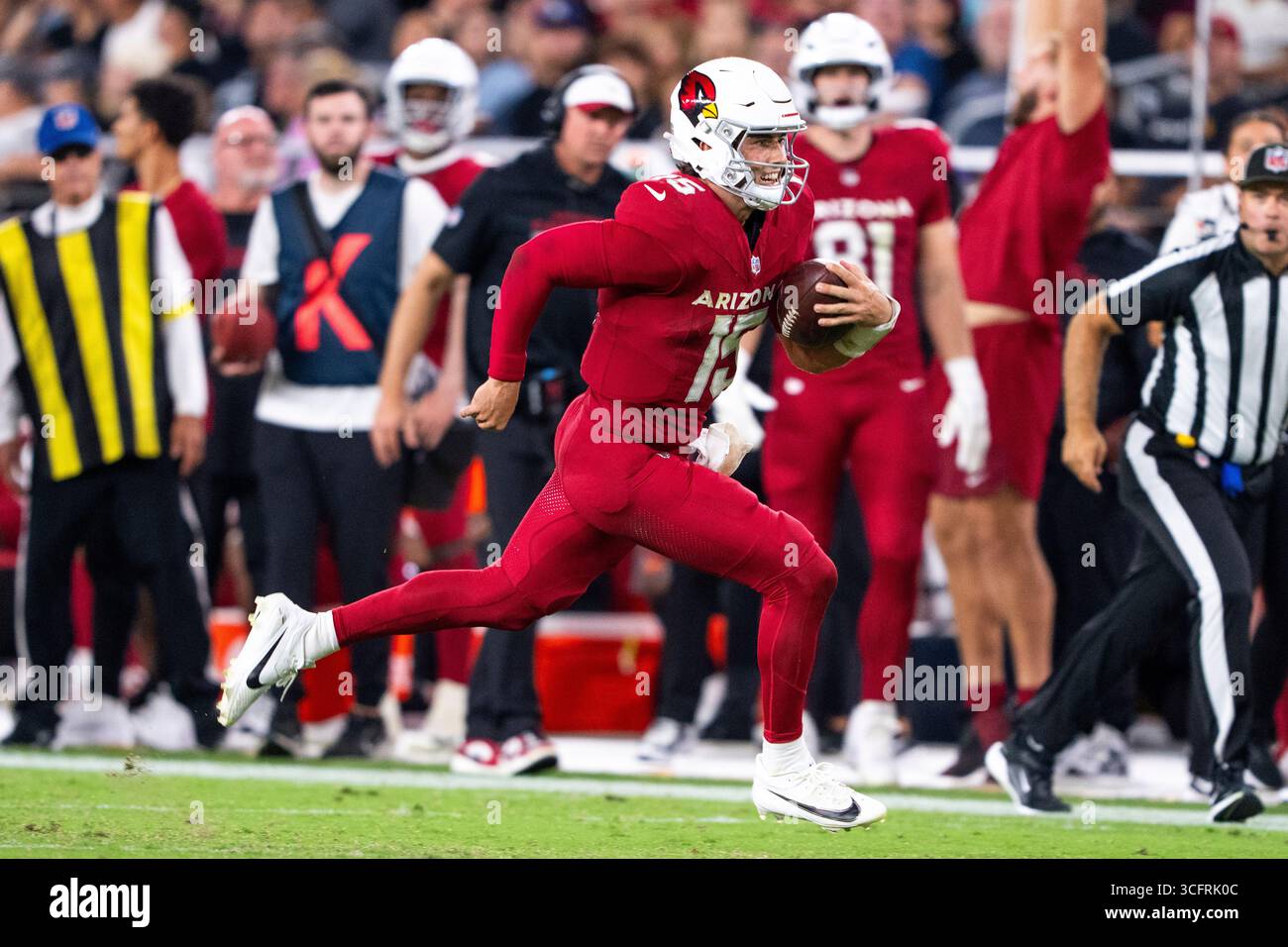Arizona Cardinals quarterback Clayton Tune (15) runs with the ball in a ...